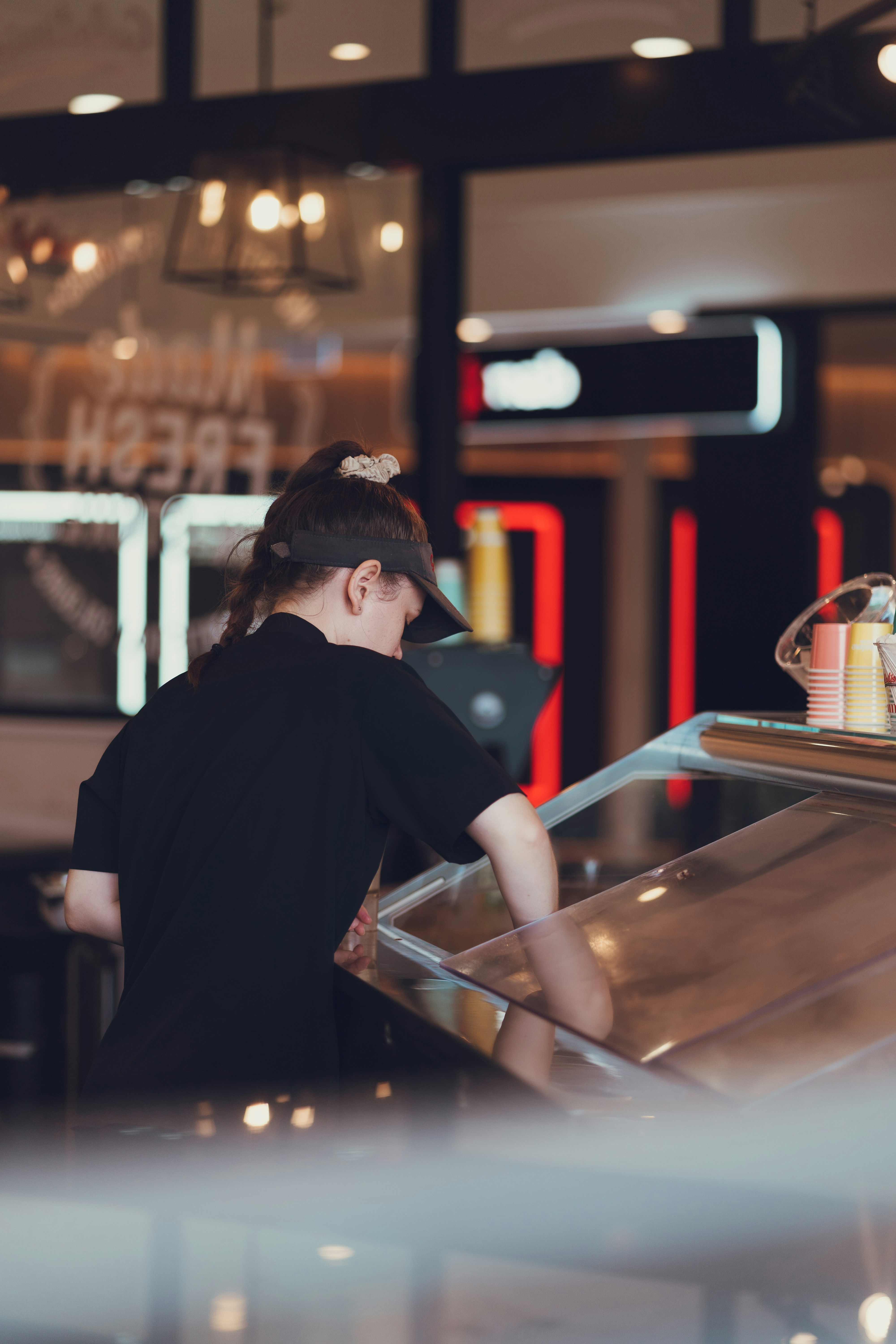 Hidden Barista at Work: A Quiet Moment Behind the Counter