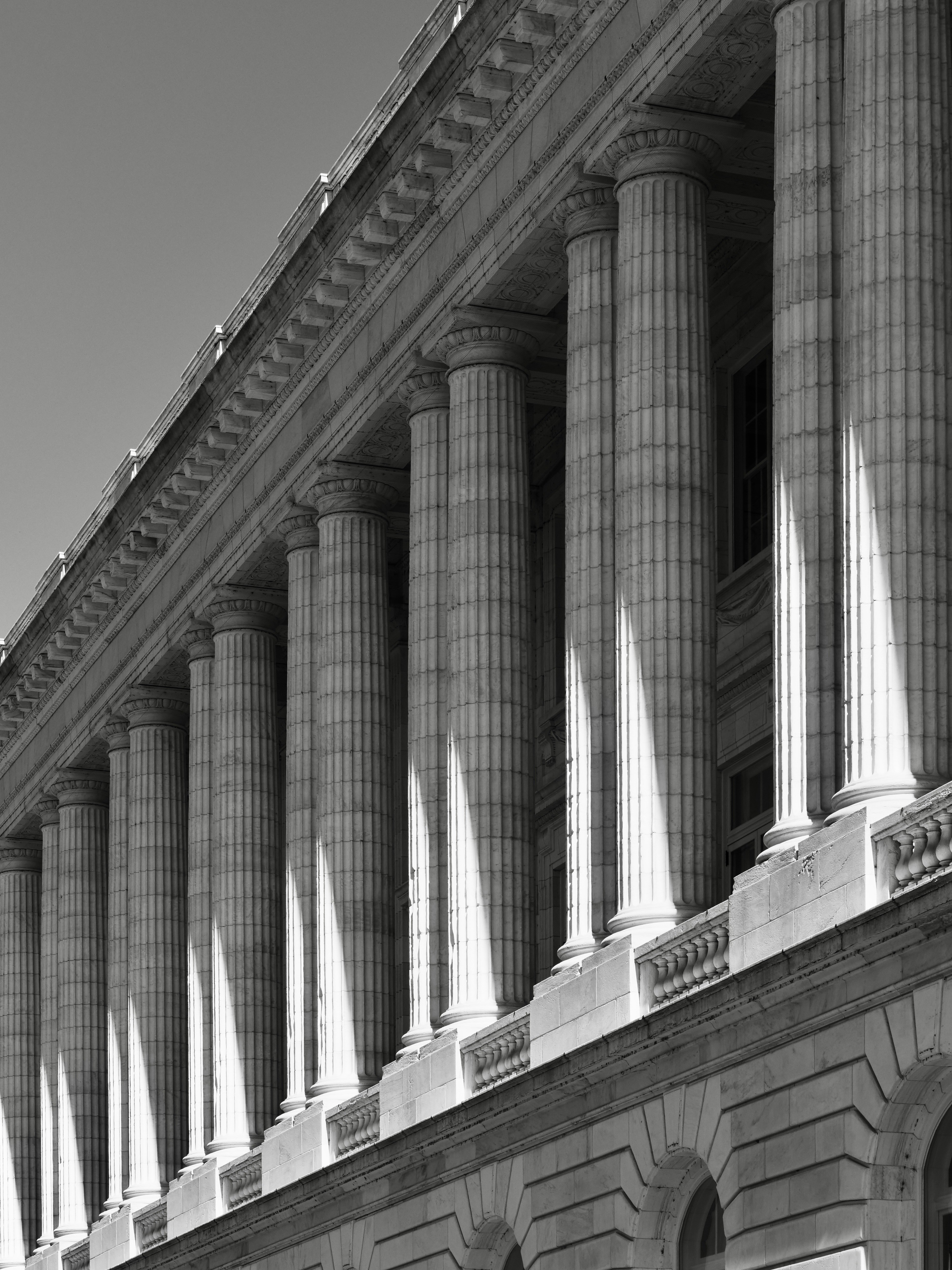 Columns of Time: A Gray-Stone Chronicle of Light and Shadow