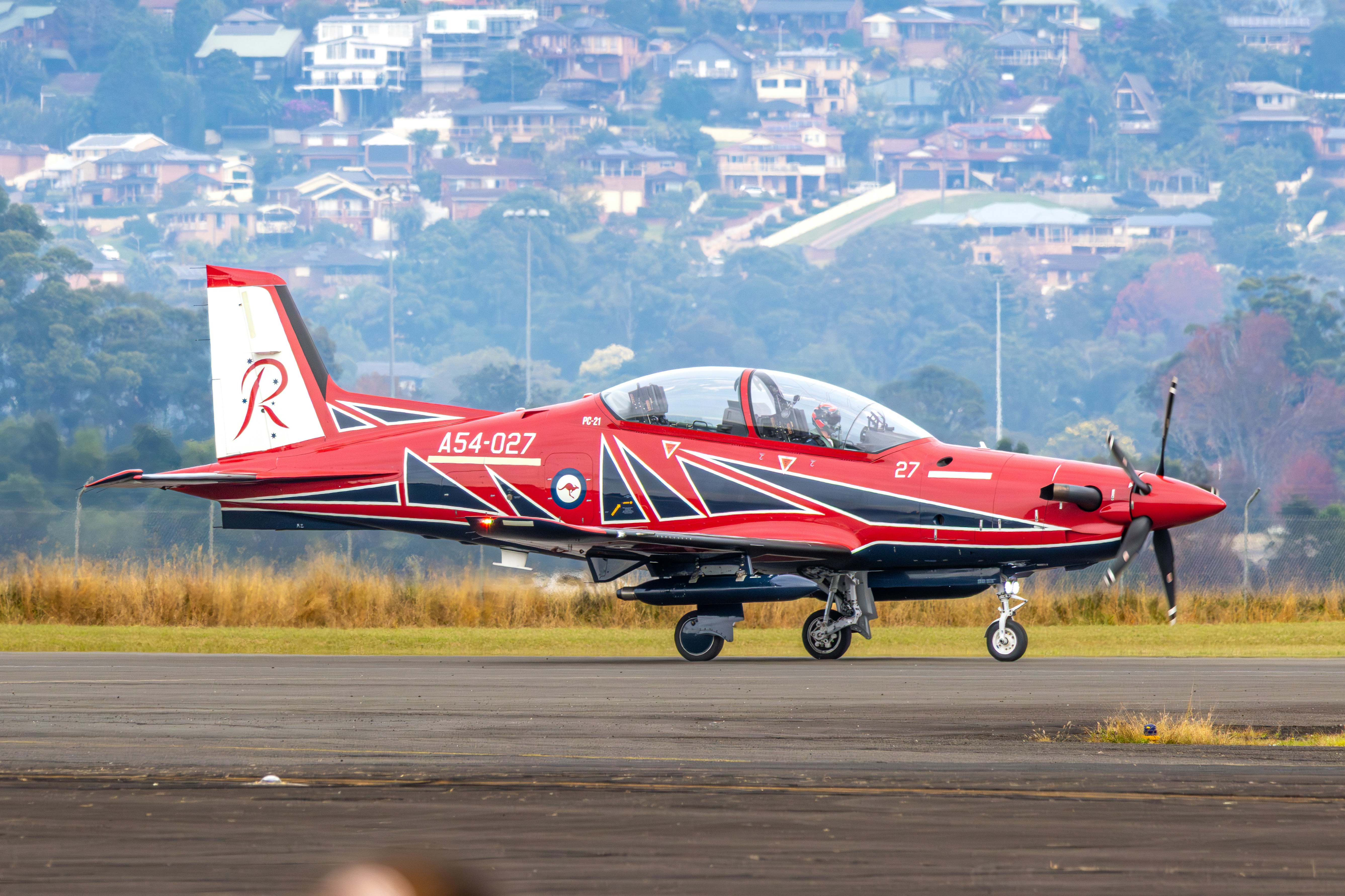 Red Precision: A National Aerobatic Trainer on the Tarmac