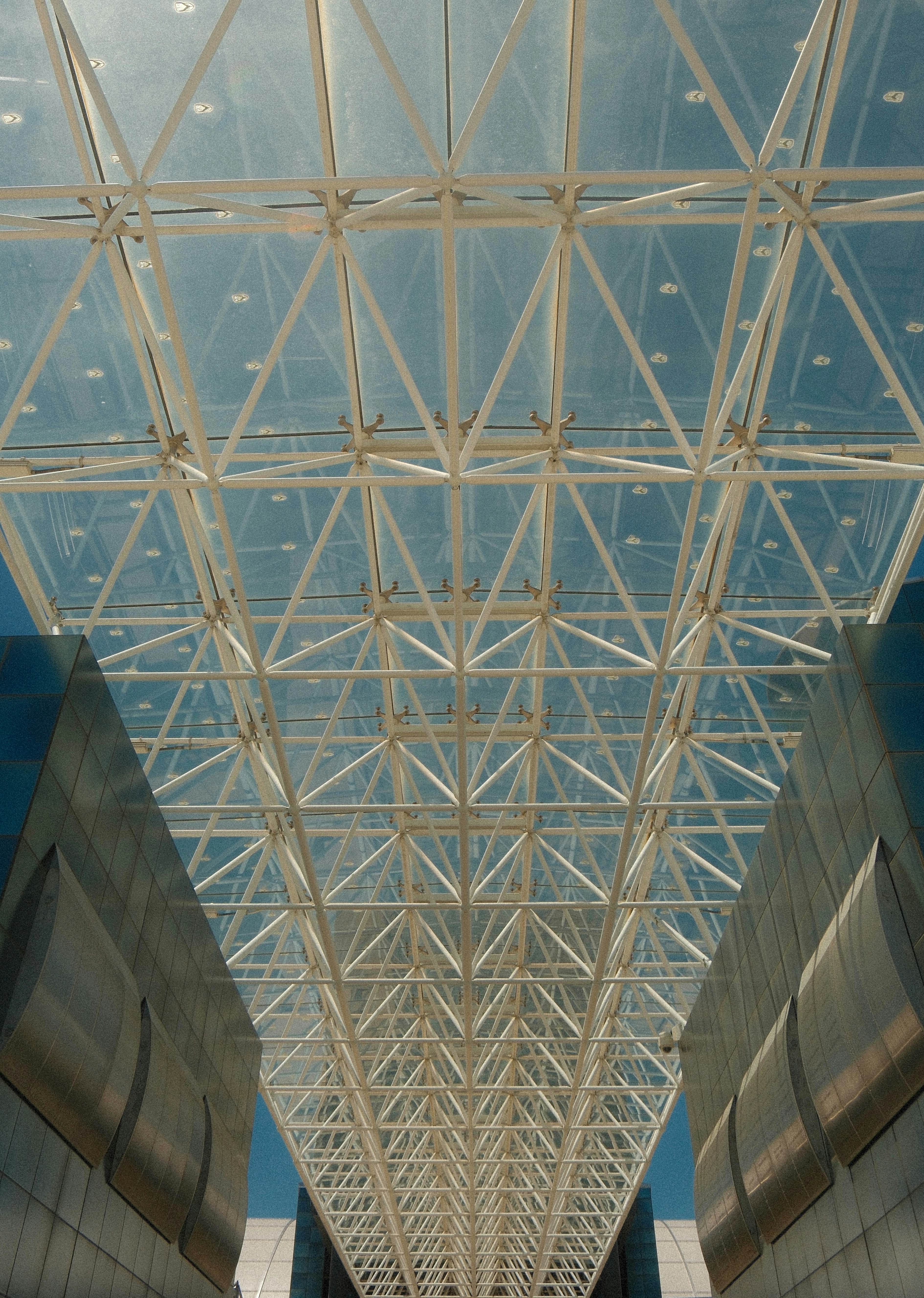 Triangular Skyframe: A Glass-Colonnade of Steel and Light