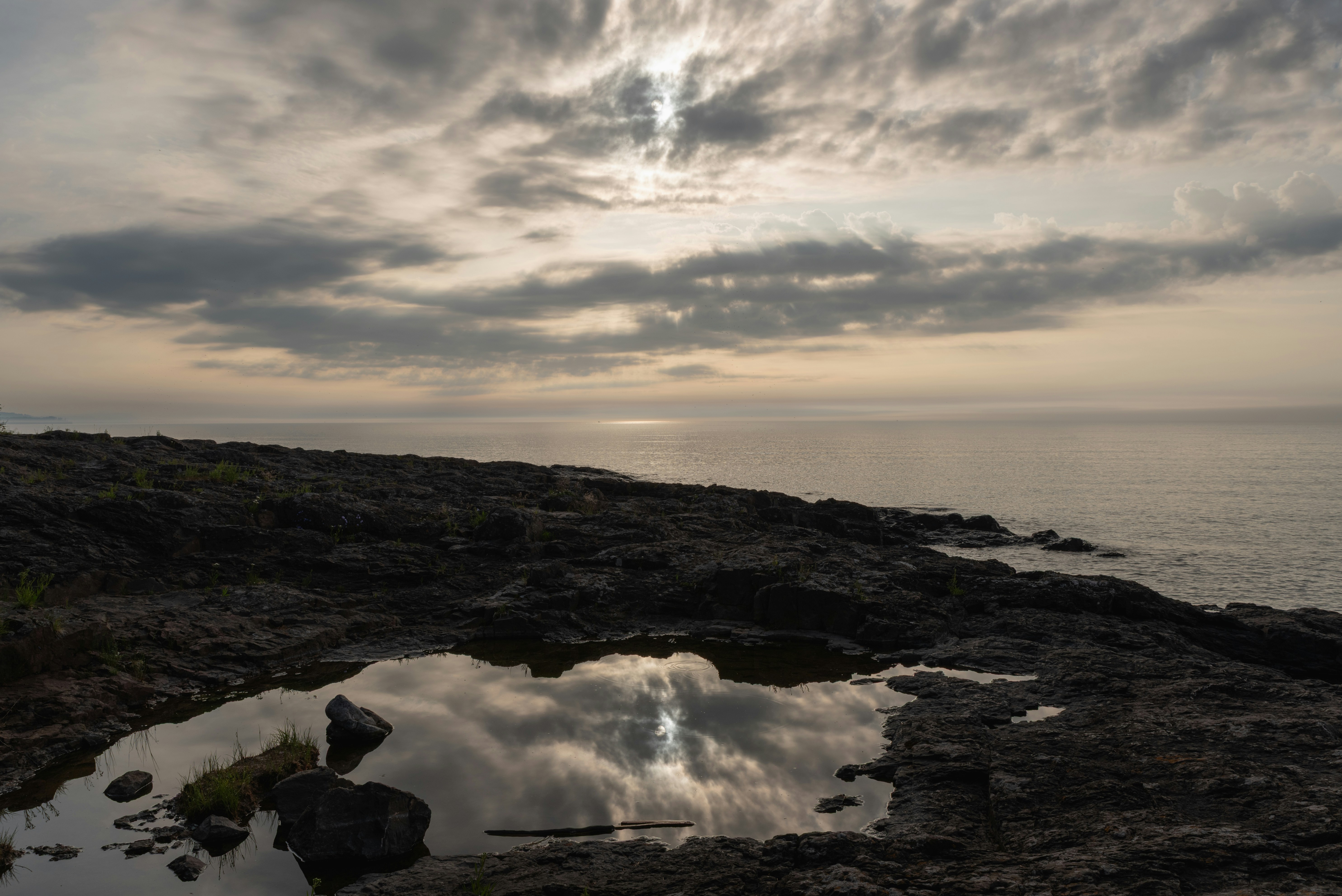 Silhouetted Tides: Quiet Pool Reflections at Dusk