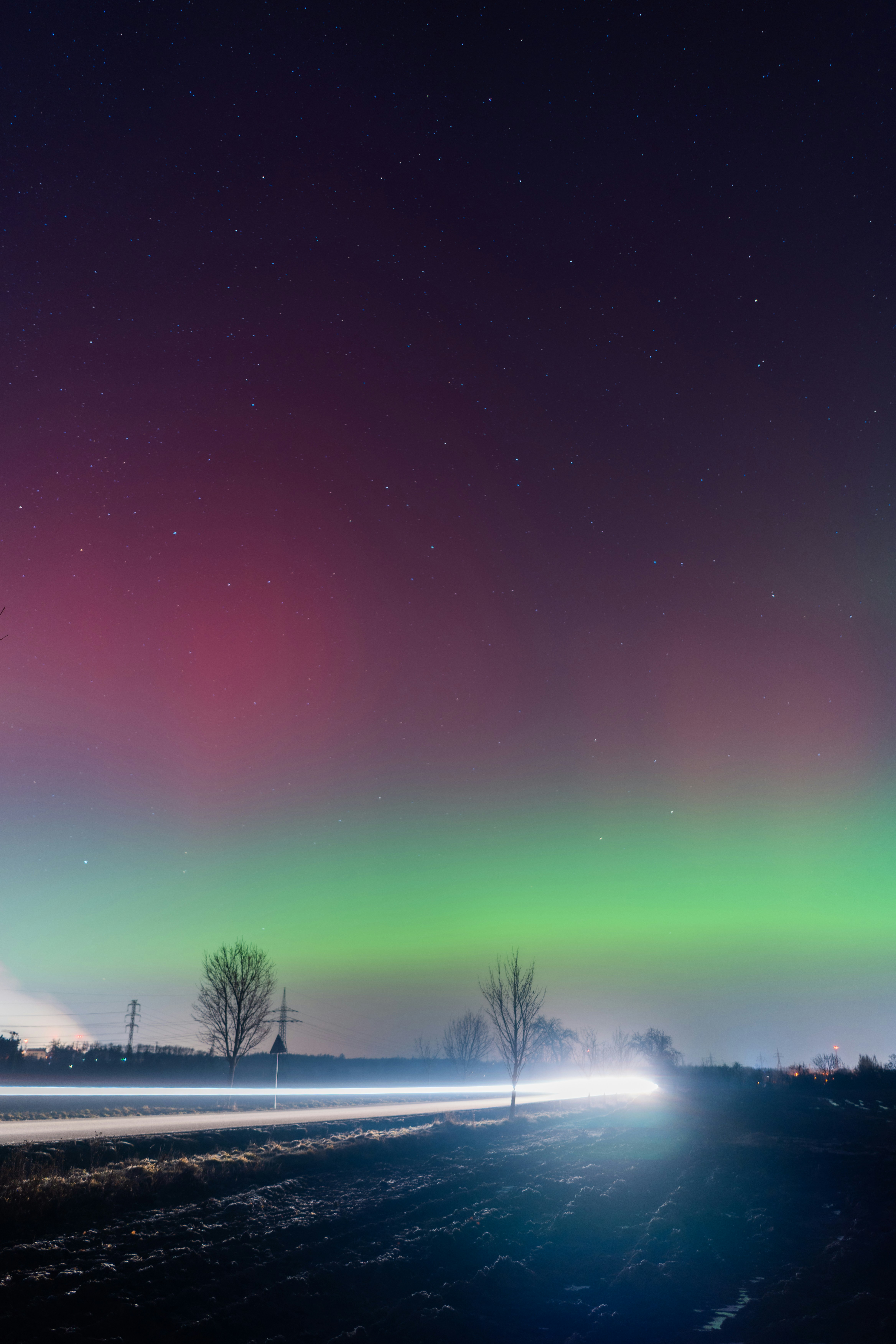 Aurora Ridge Over Quiet Farmland