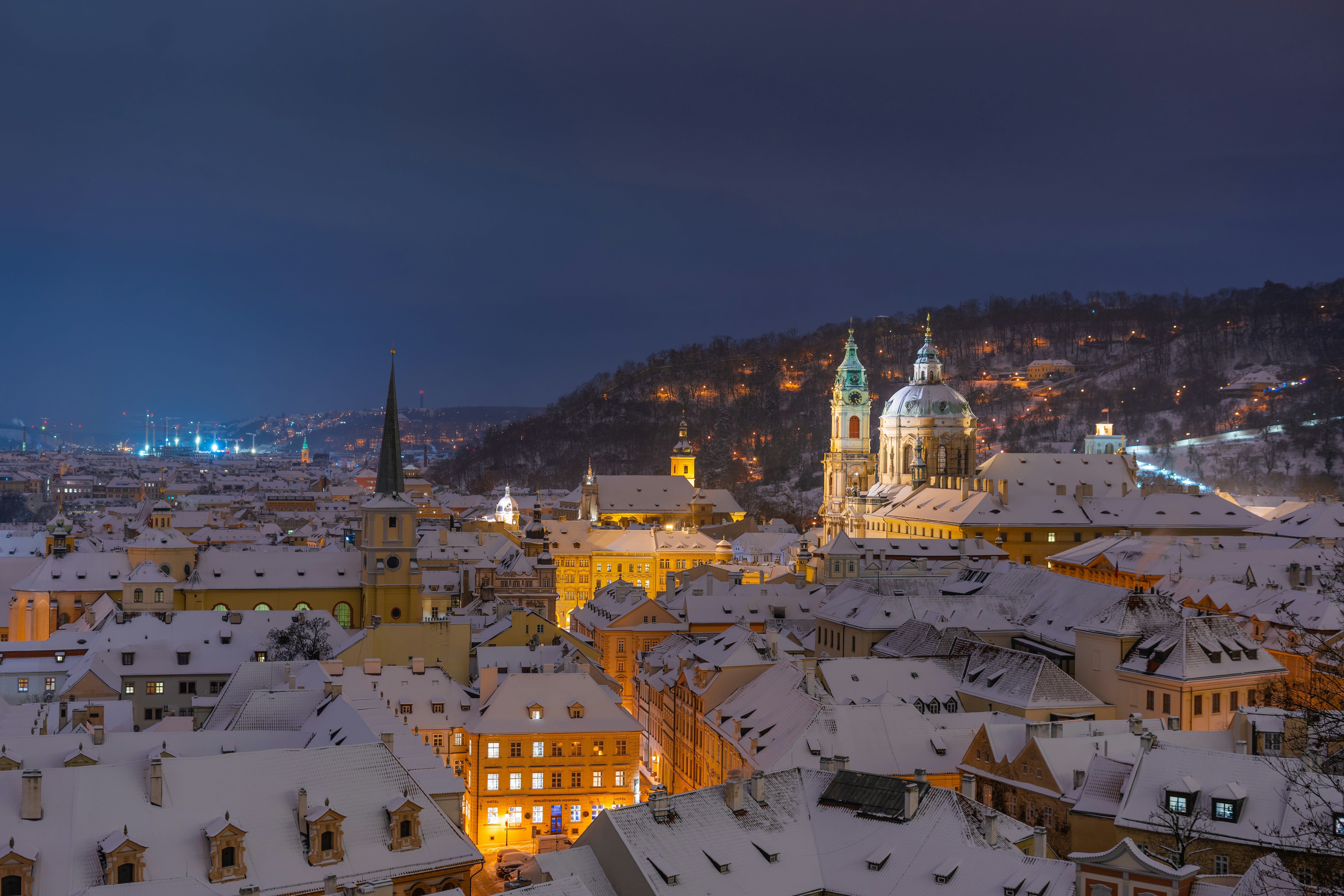 Moonlit Prague Rooftops Under a Velvet Sky