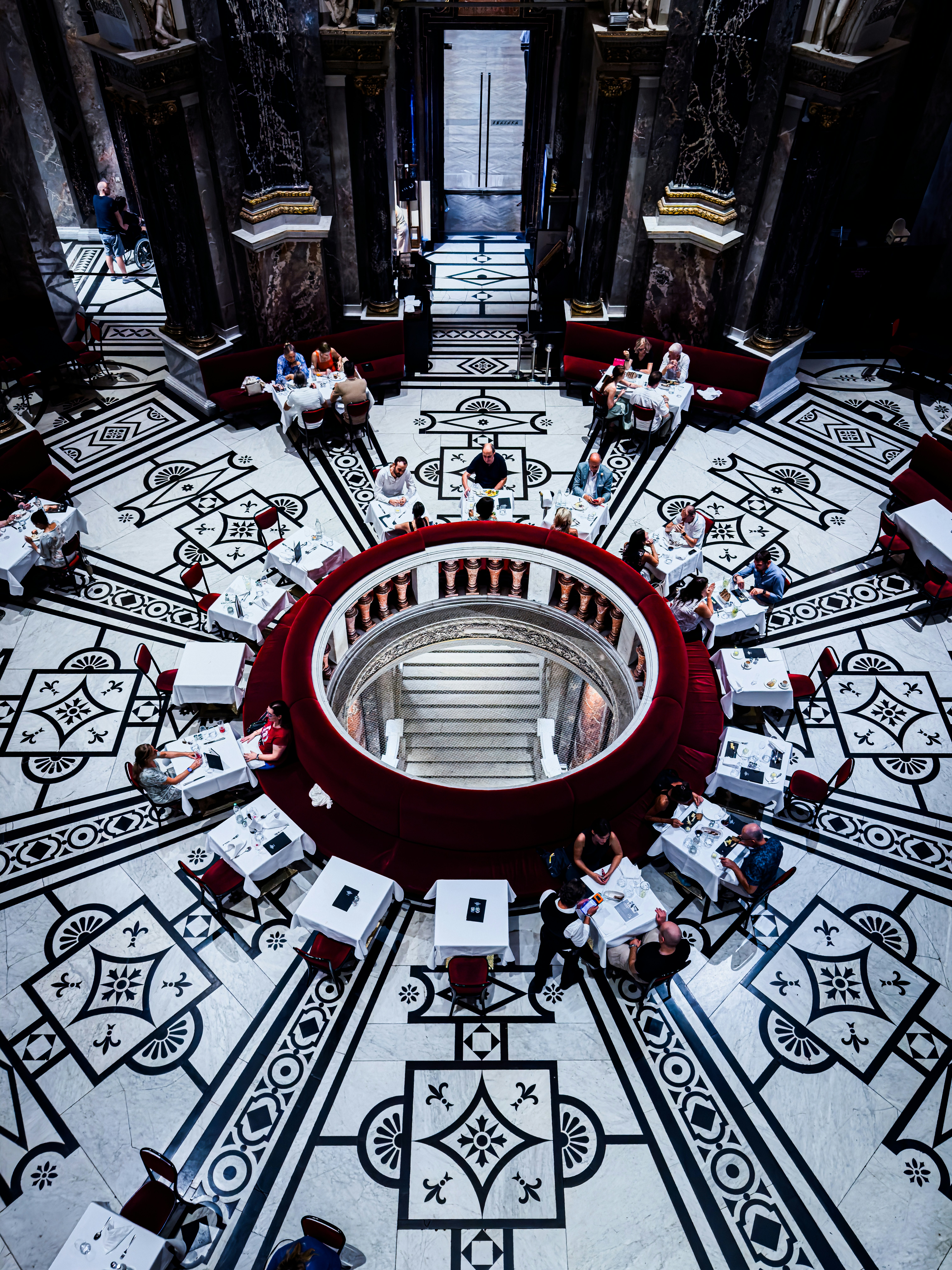 Circular Staircase Retreat: Dining Around the Marble Rift