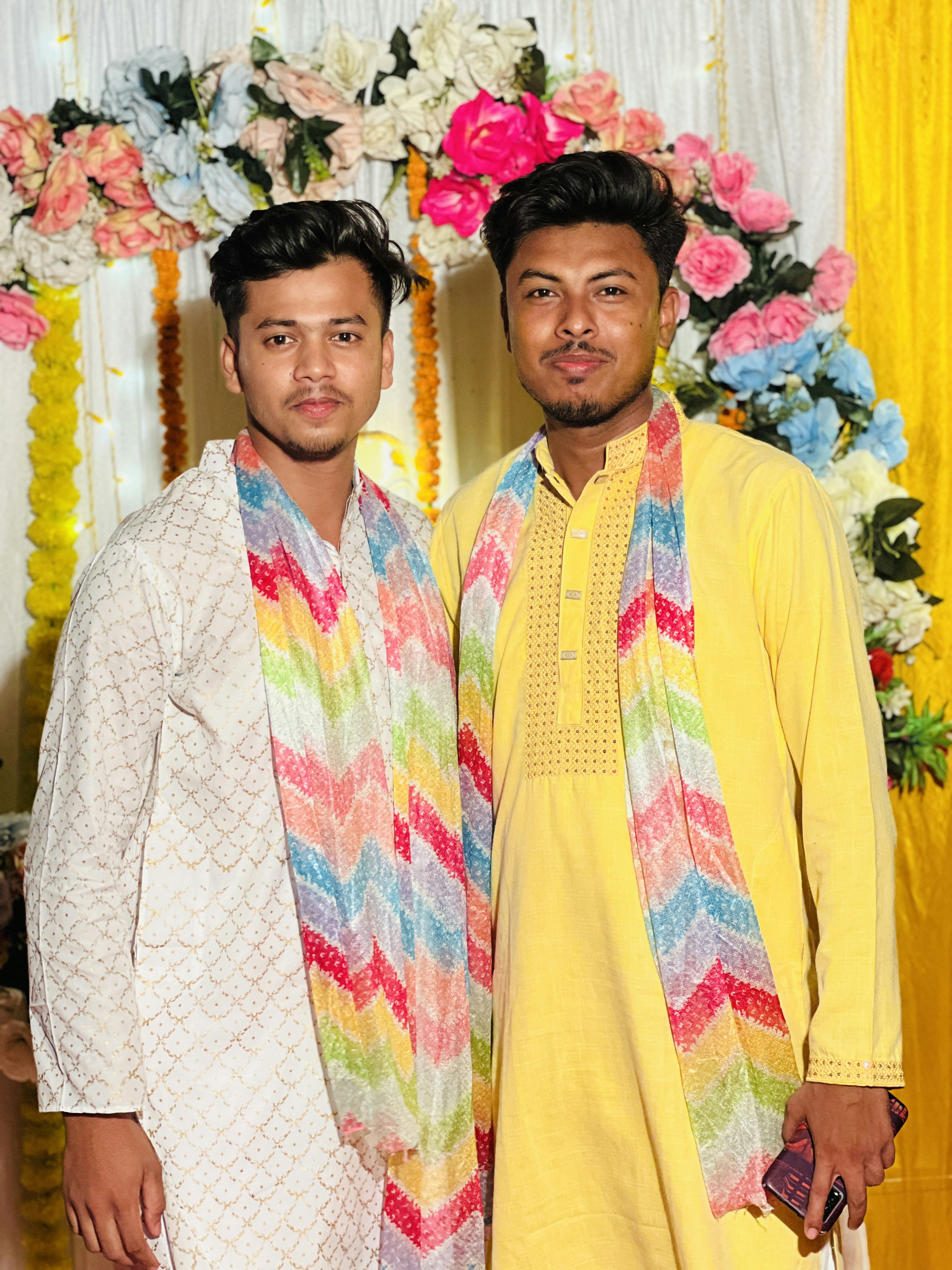 Vibrant Festive Portrait of Two Friends in Bright Attire
