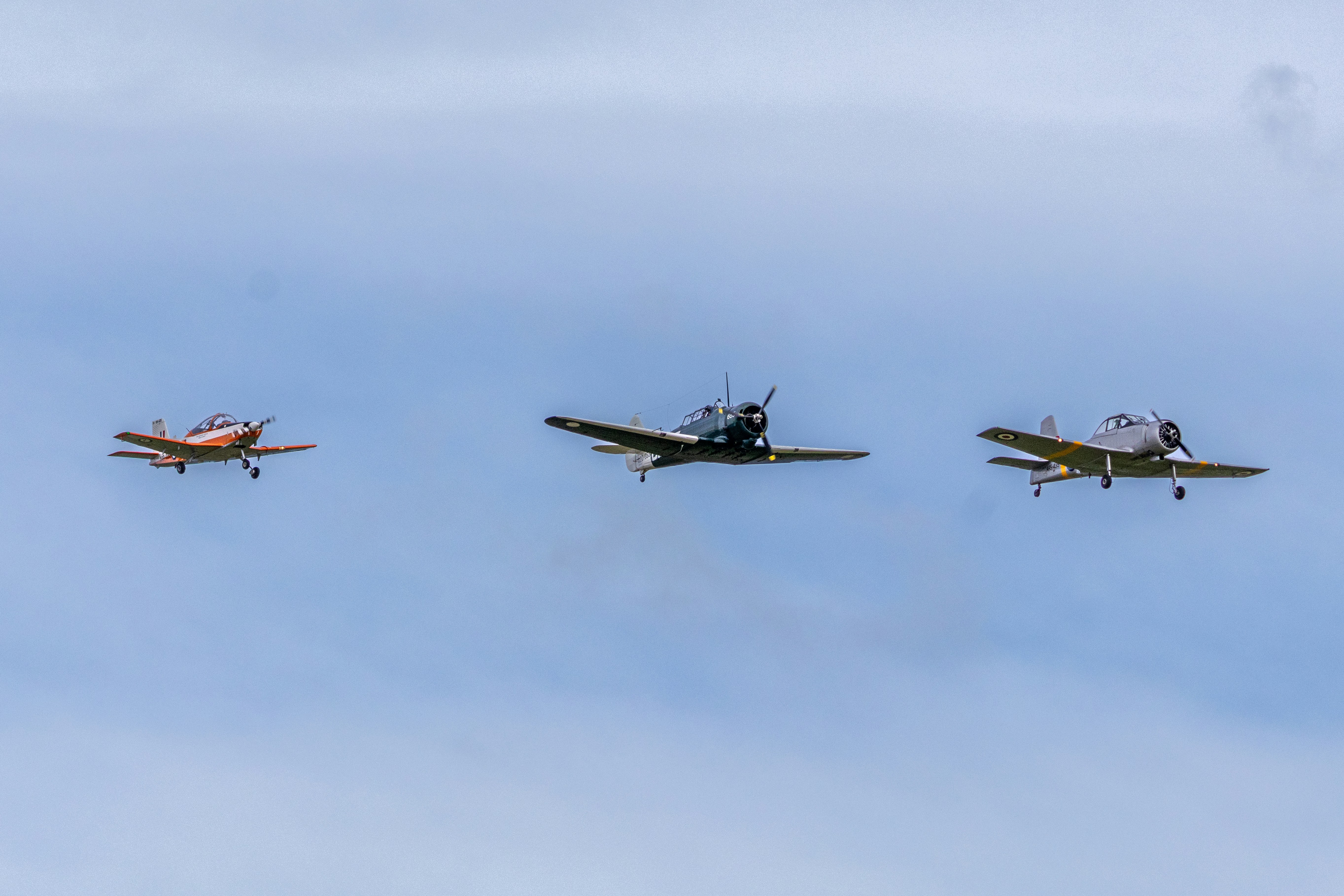 Triad in the Sky: Vintage Trainers in Formation