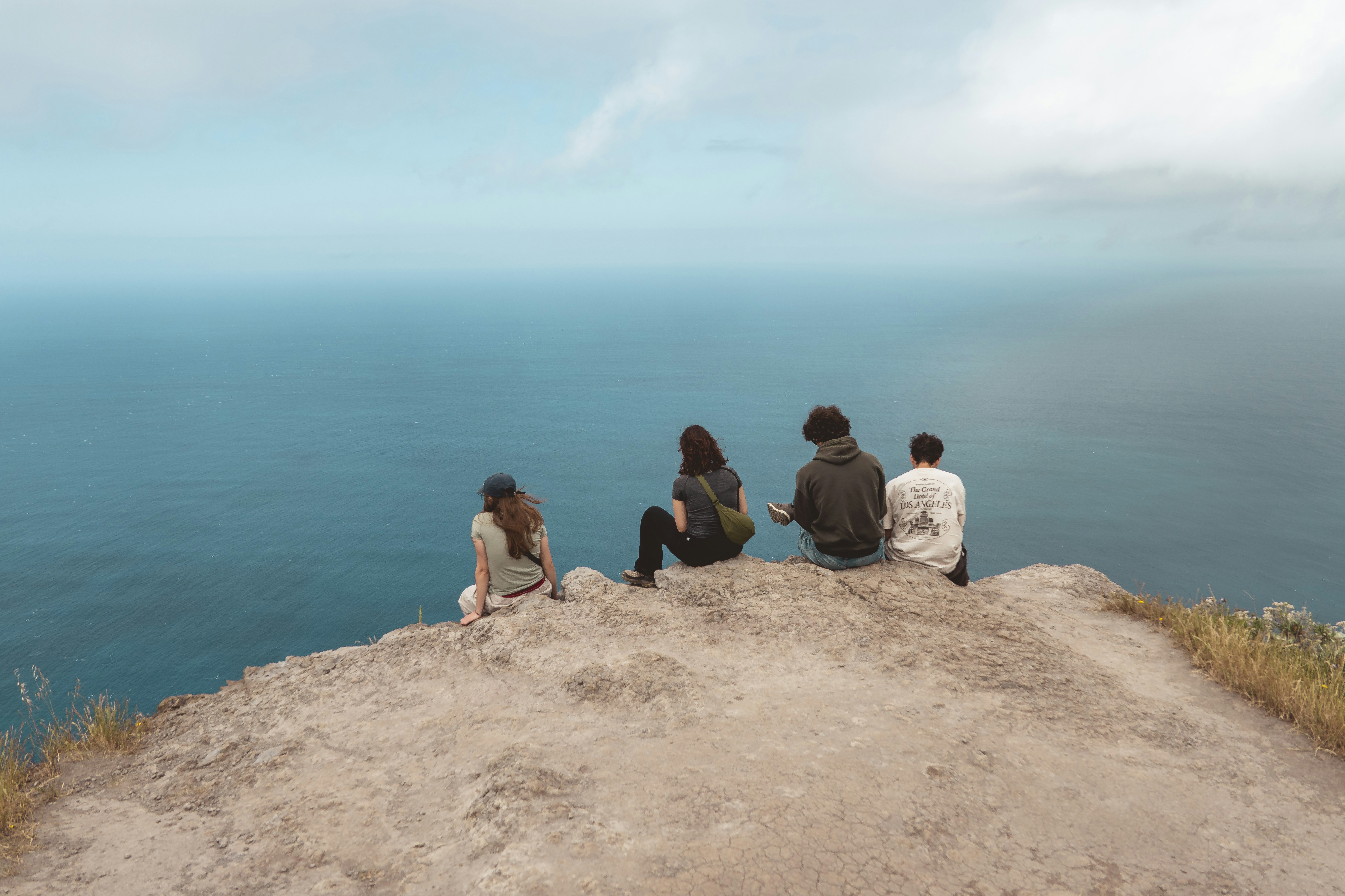 Edge of the World: Friends at the Cliff's Quiet Horizon