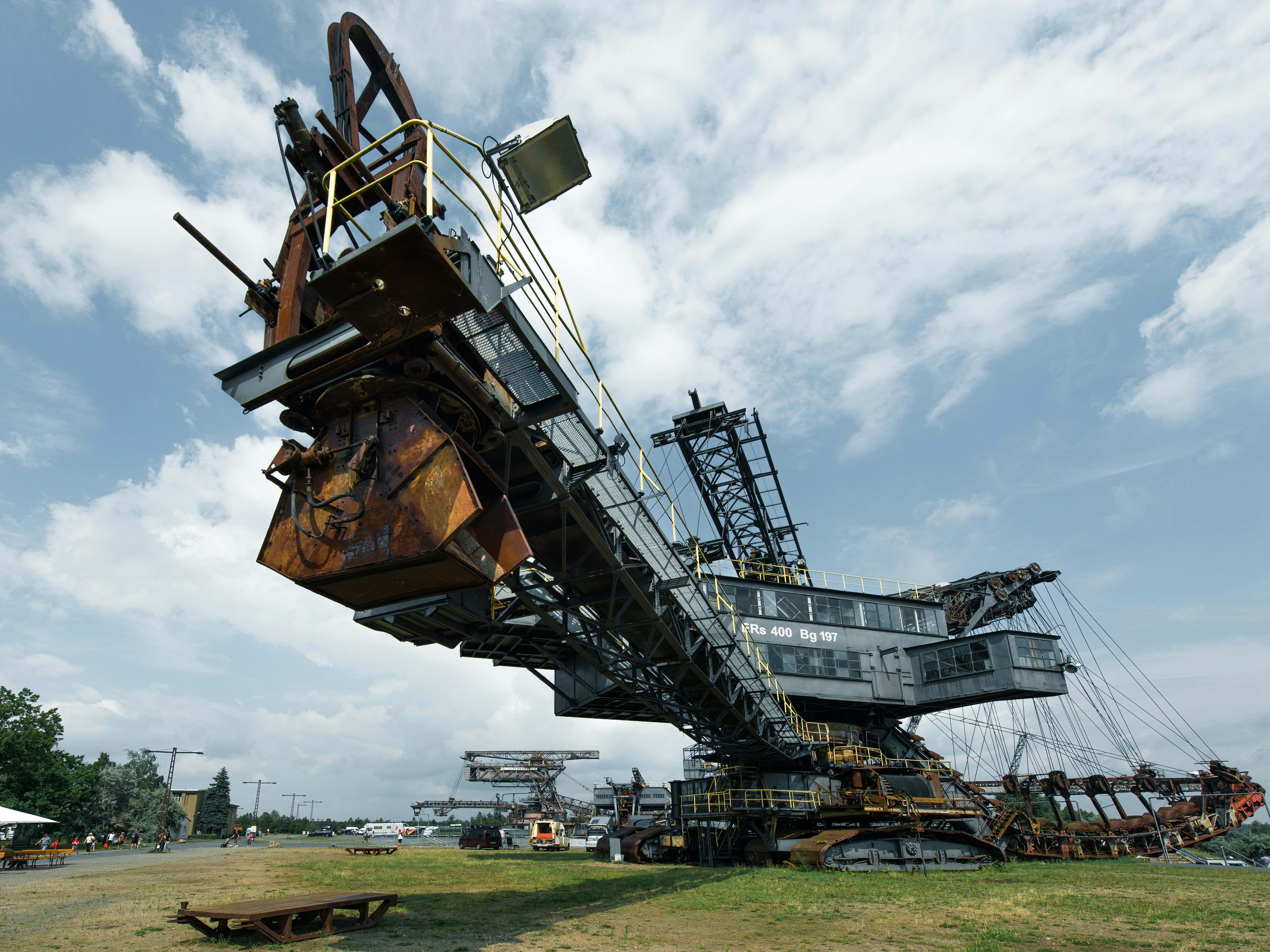 Titan of the Quarry: A Rusted Colossus Reaches Toward the Sky
