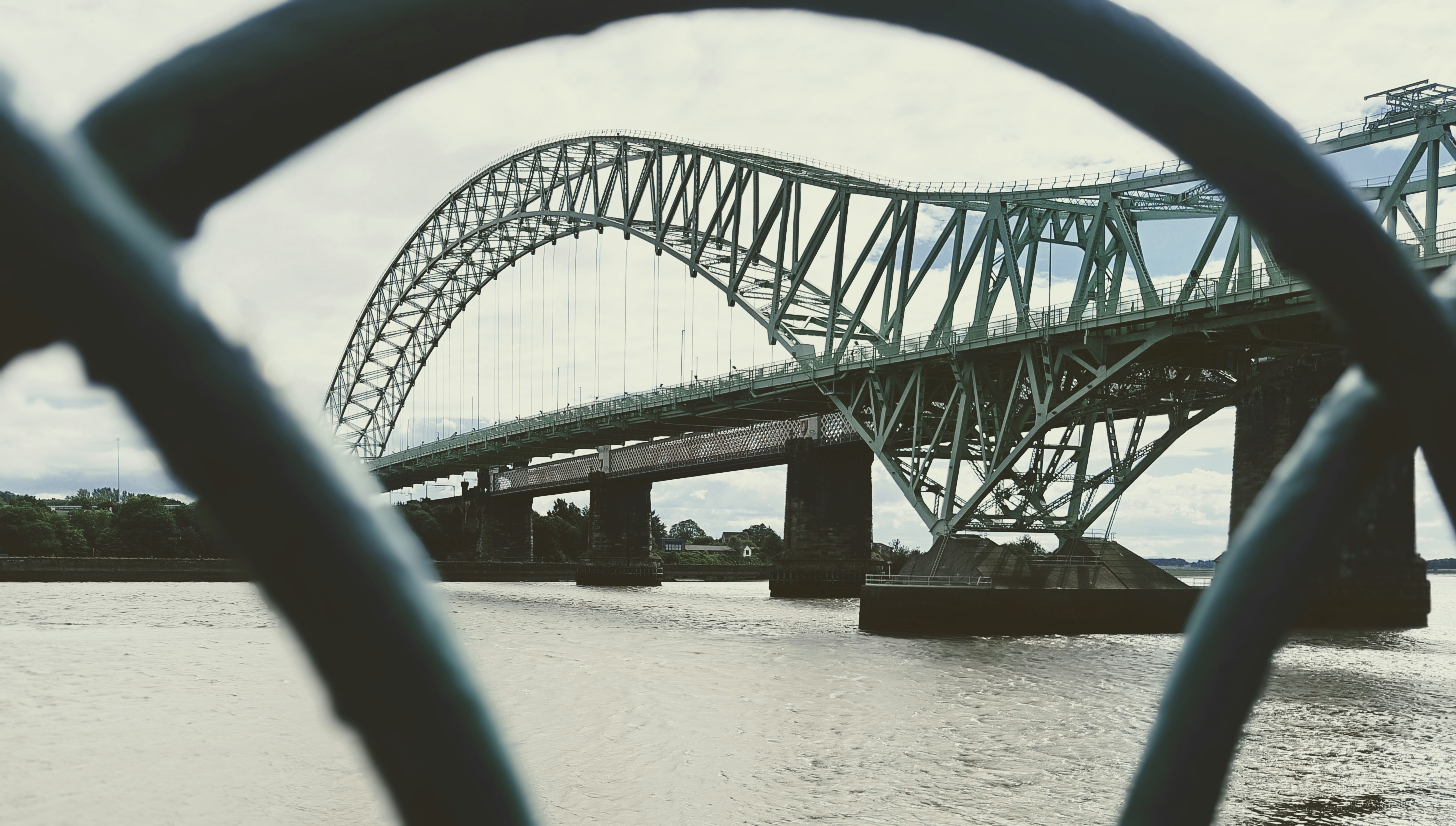 Arc of Steel: Framing the Bridge Through a Parkway of Curves
