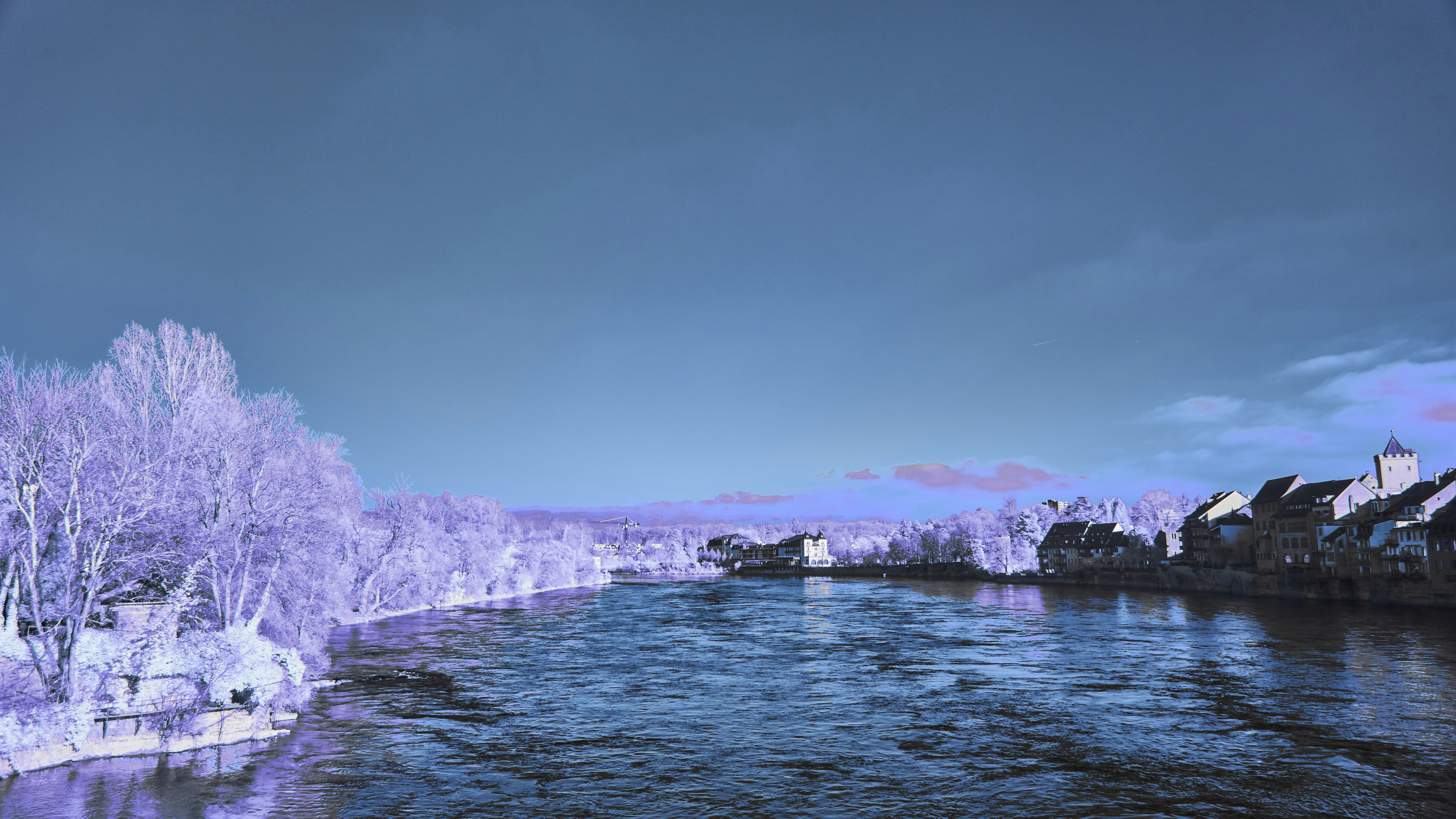 Iridescent Riverbend: A Quiet Town Under Violet Skies
