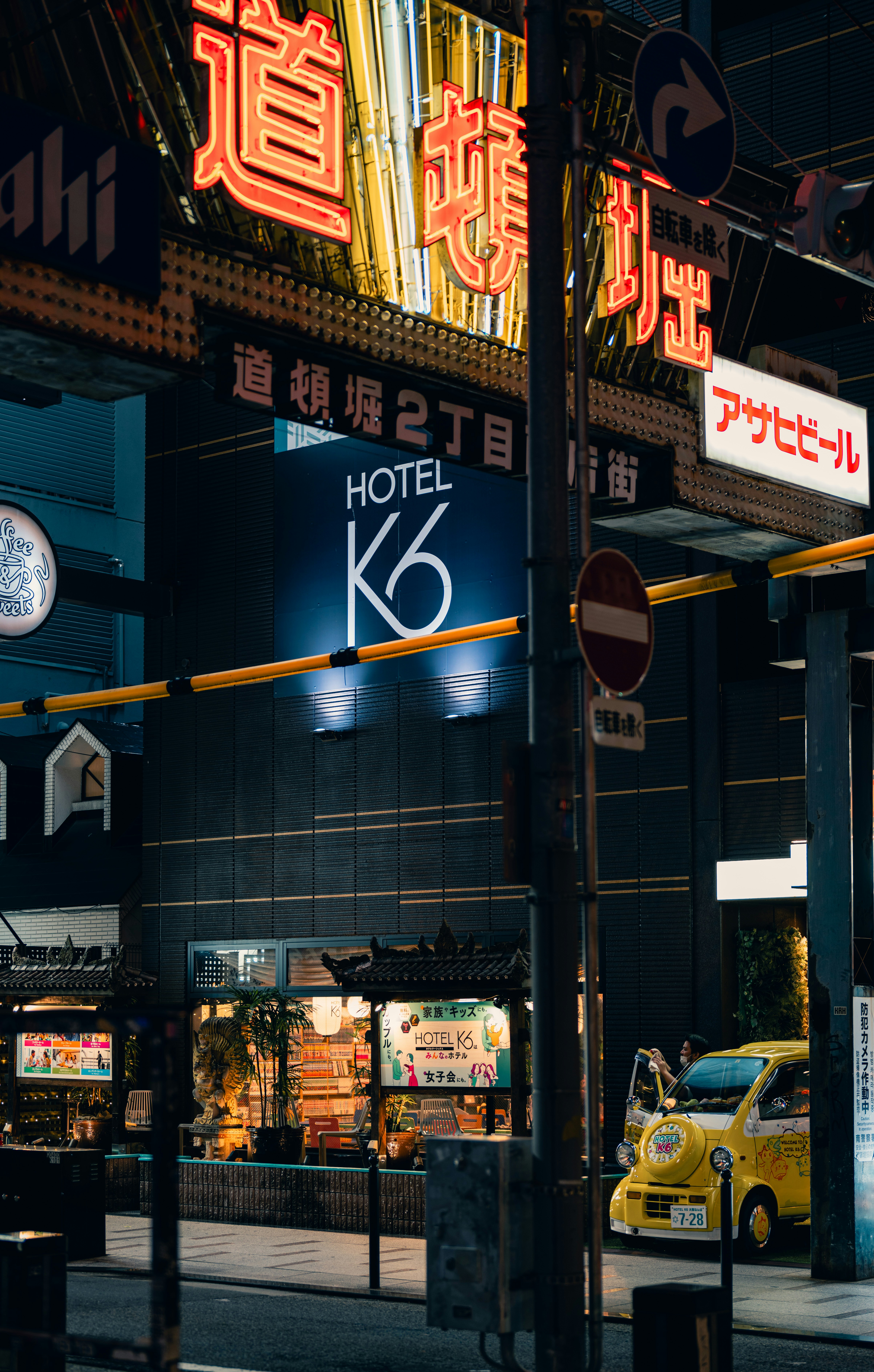 Neon Corridor: Hotel K6 Beckons in Tokyo Night