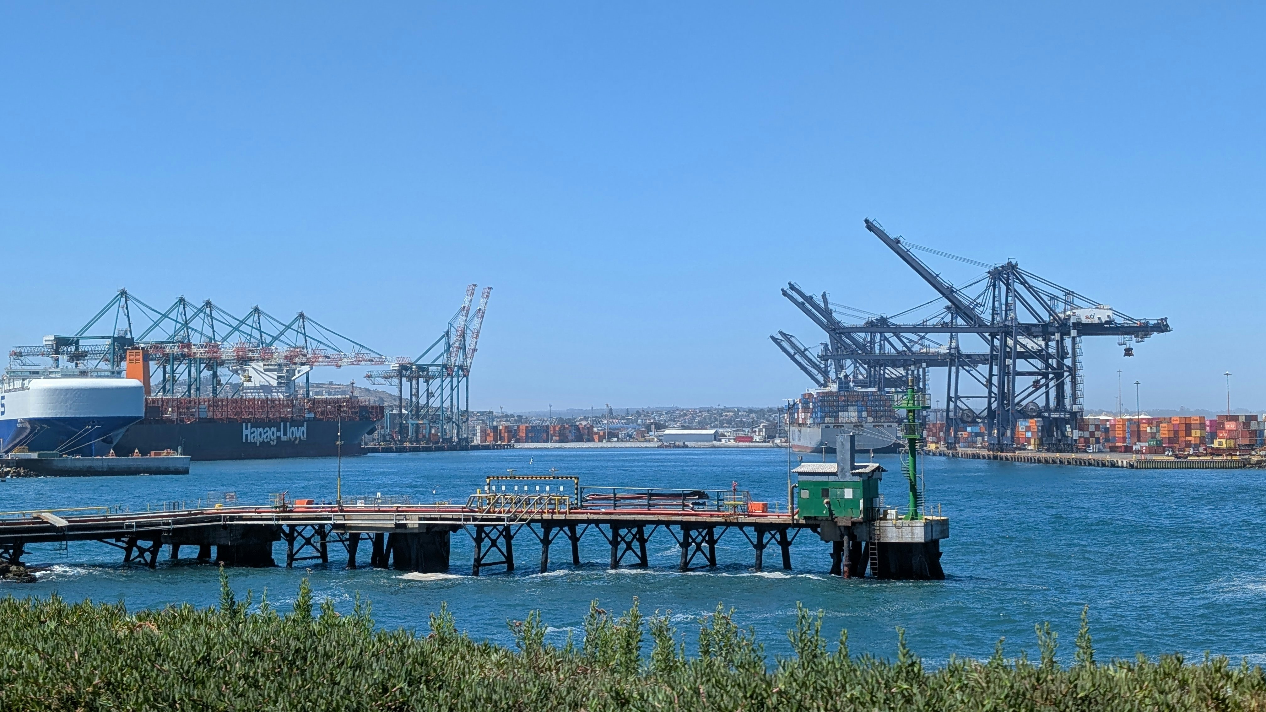 Toward the Harbor: Cranes at Distant Horizon