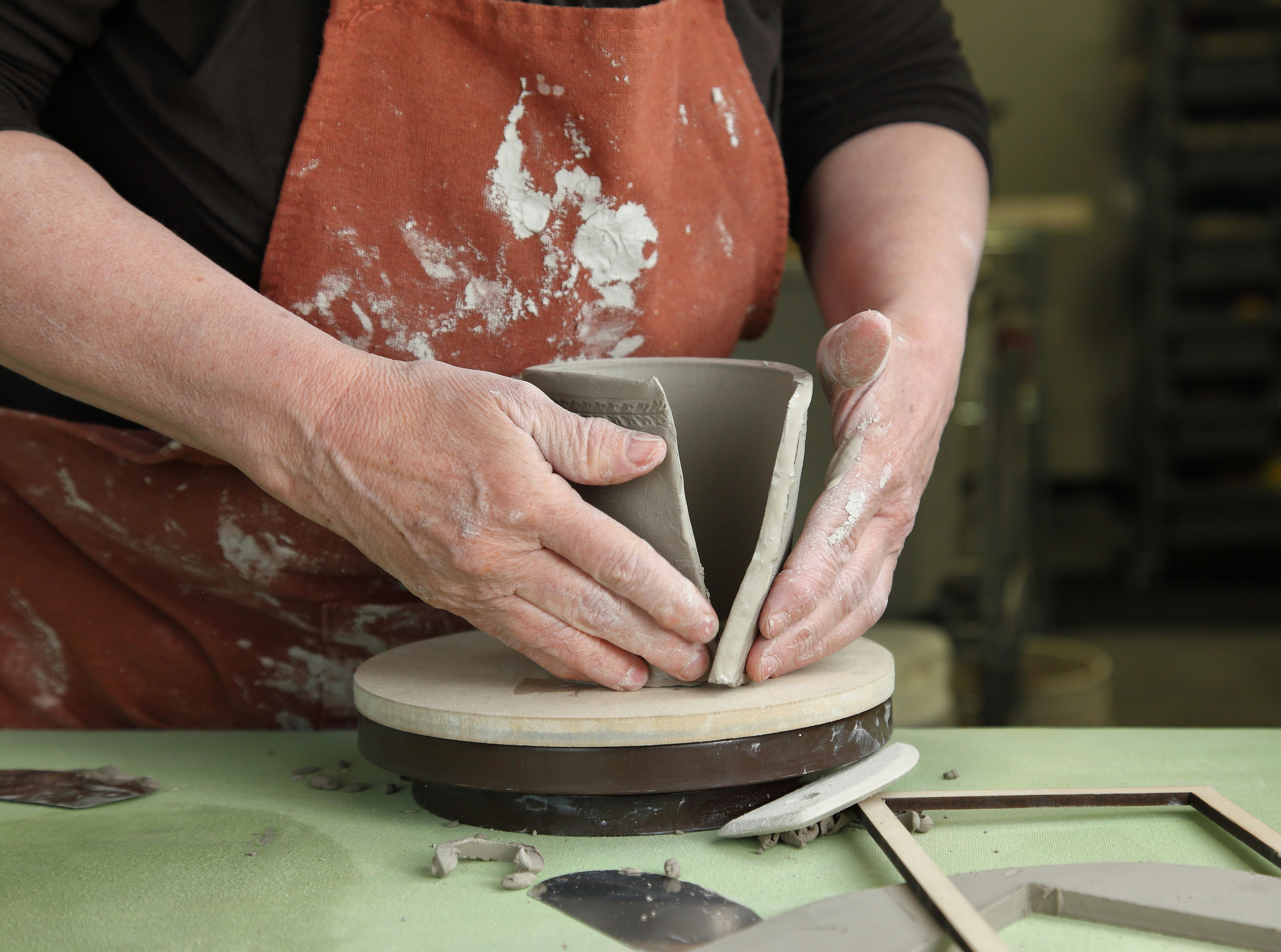 Hands in Clay: Pottery Wheel Transformation