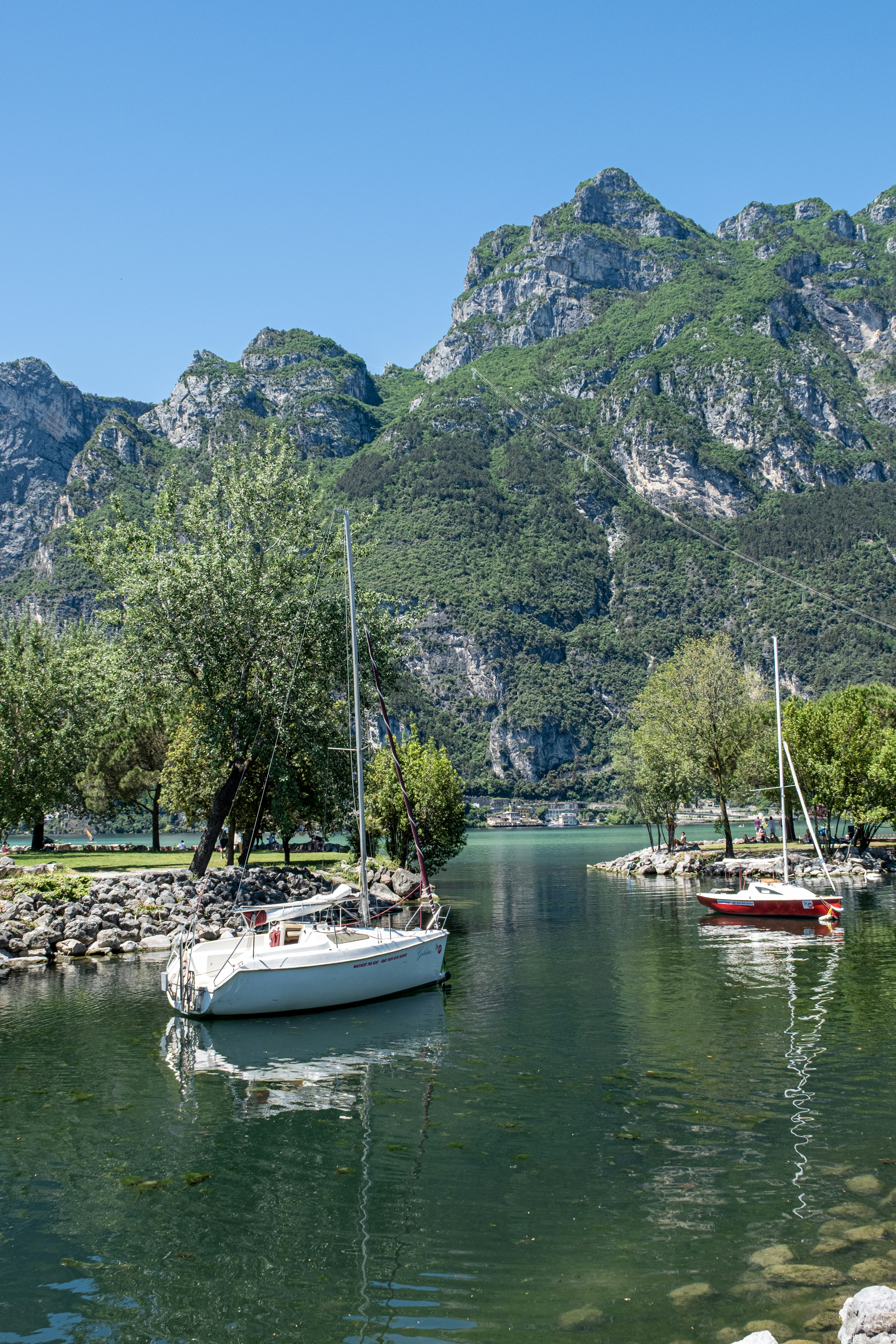 Sailboats at the Fjord: Quiet Marina Under Mountain Peaks