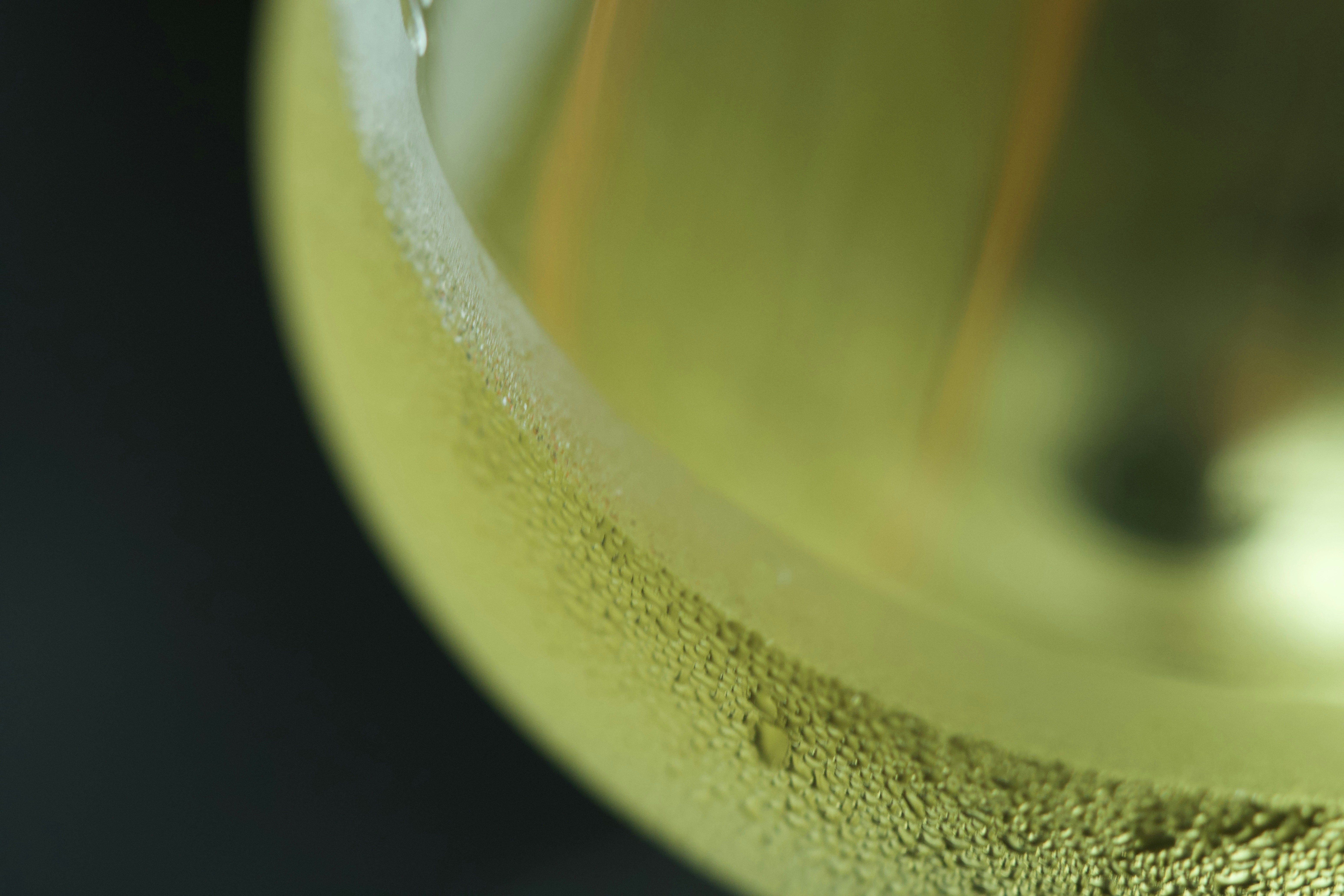 Textured yellowish-green bowl with a smooth rim.