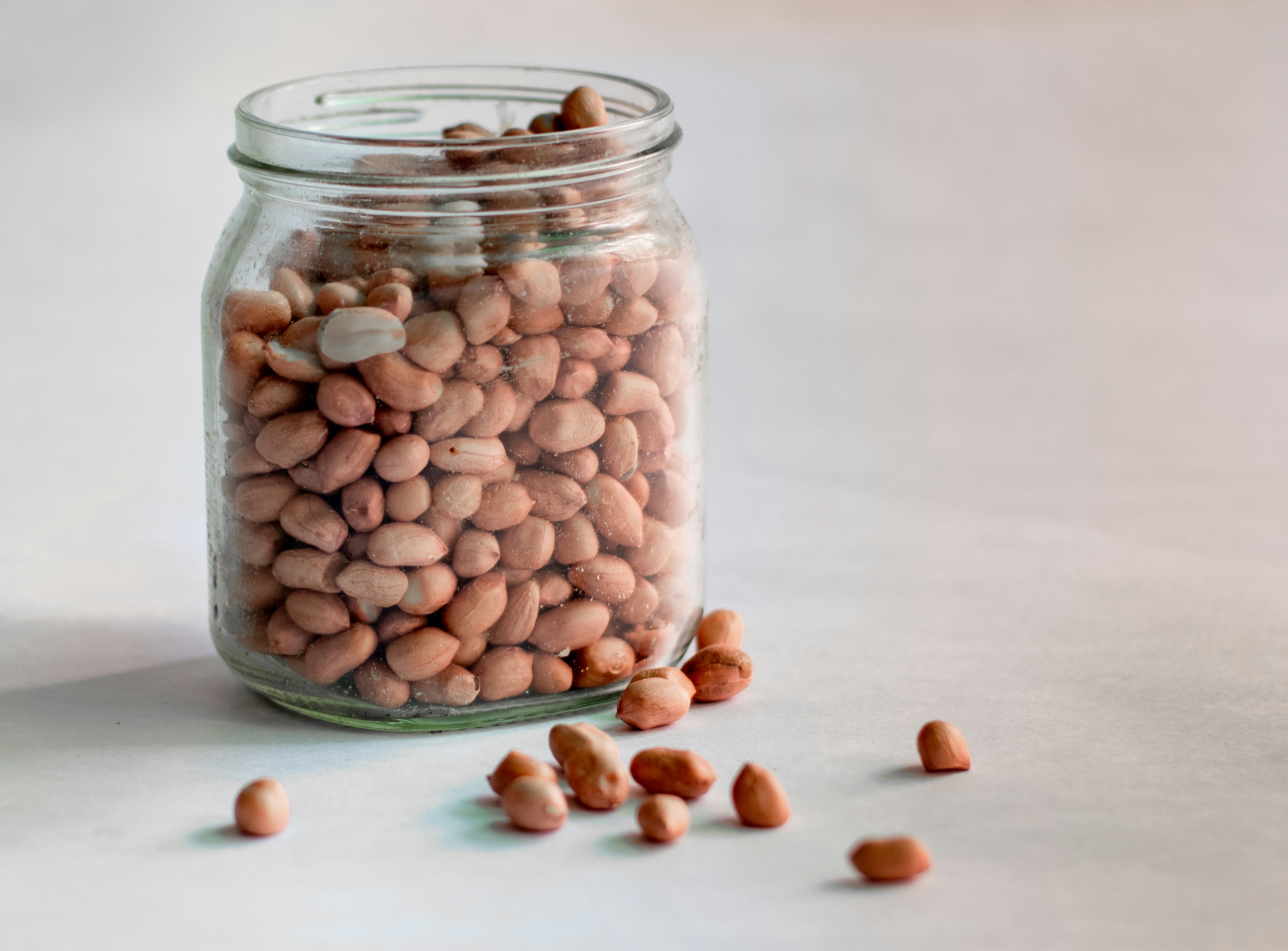 Pinned Pebbles: A Quiet Jar of Snacks on a Marble Stage