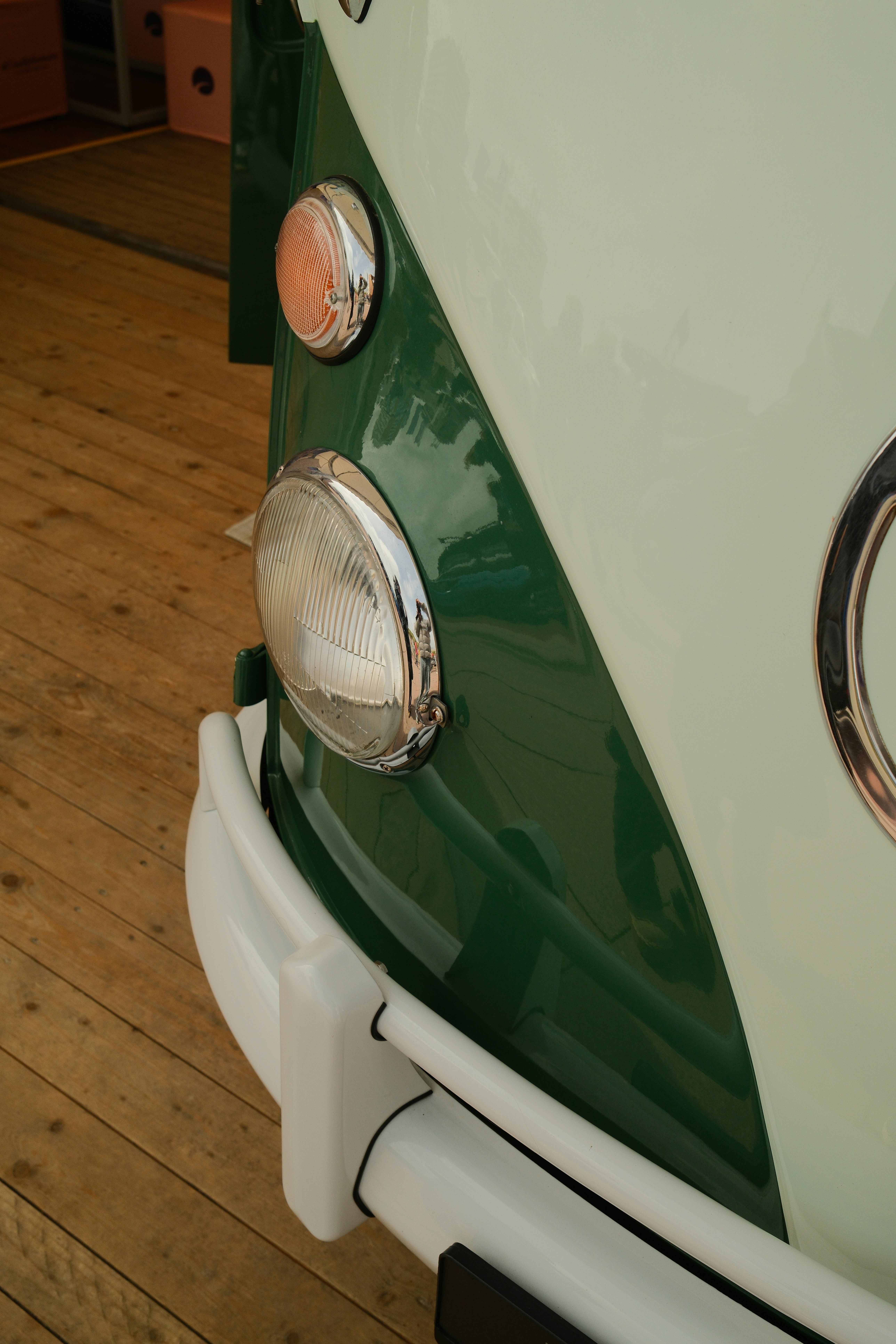 Green and Cream Volkswagen Face: A Close-Up of the Vintage Front