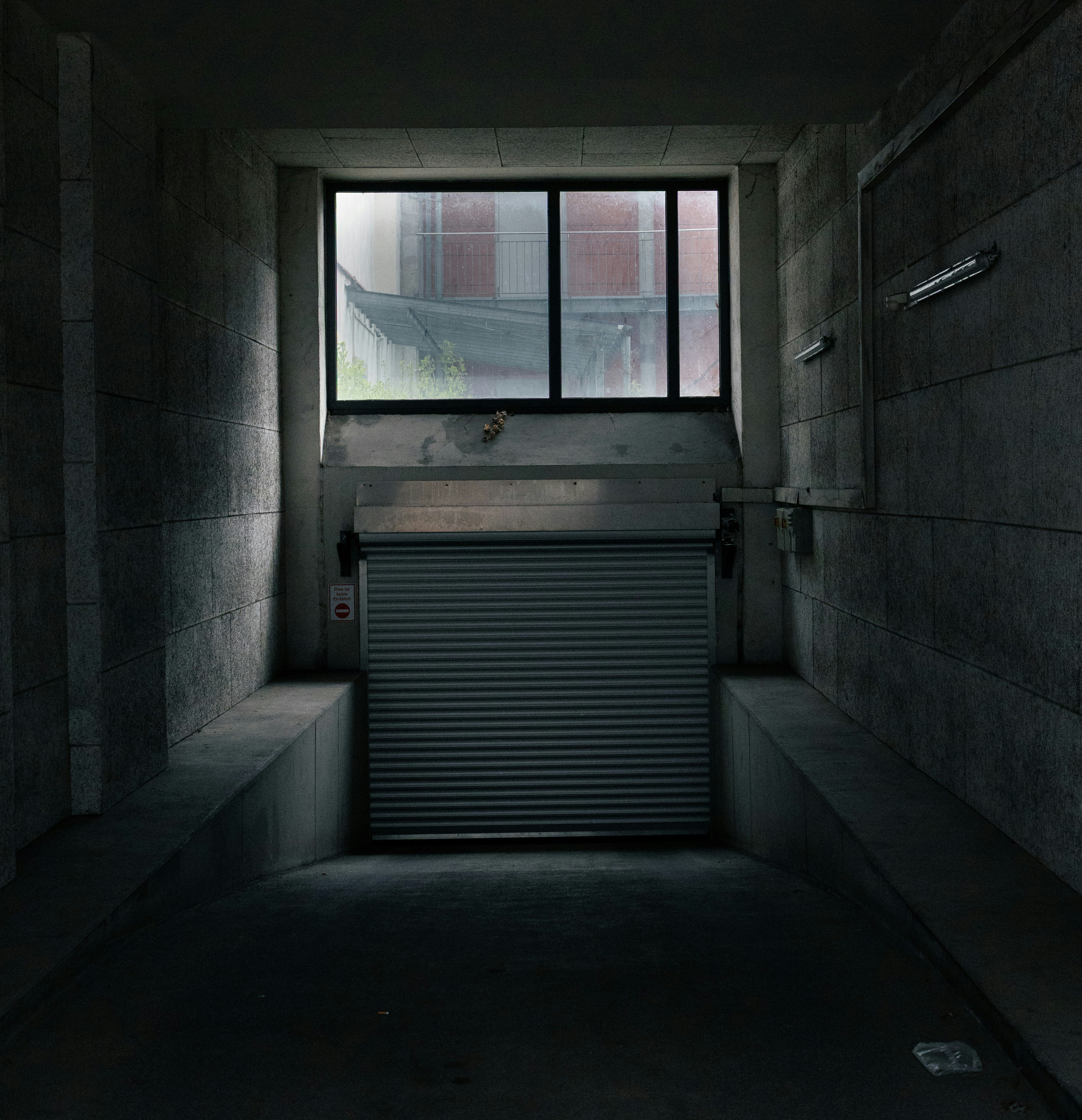 Dim Garage Portal: Light at the End of the Tunnel