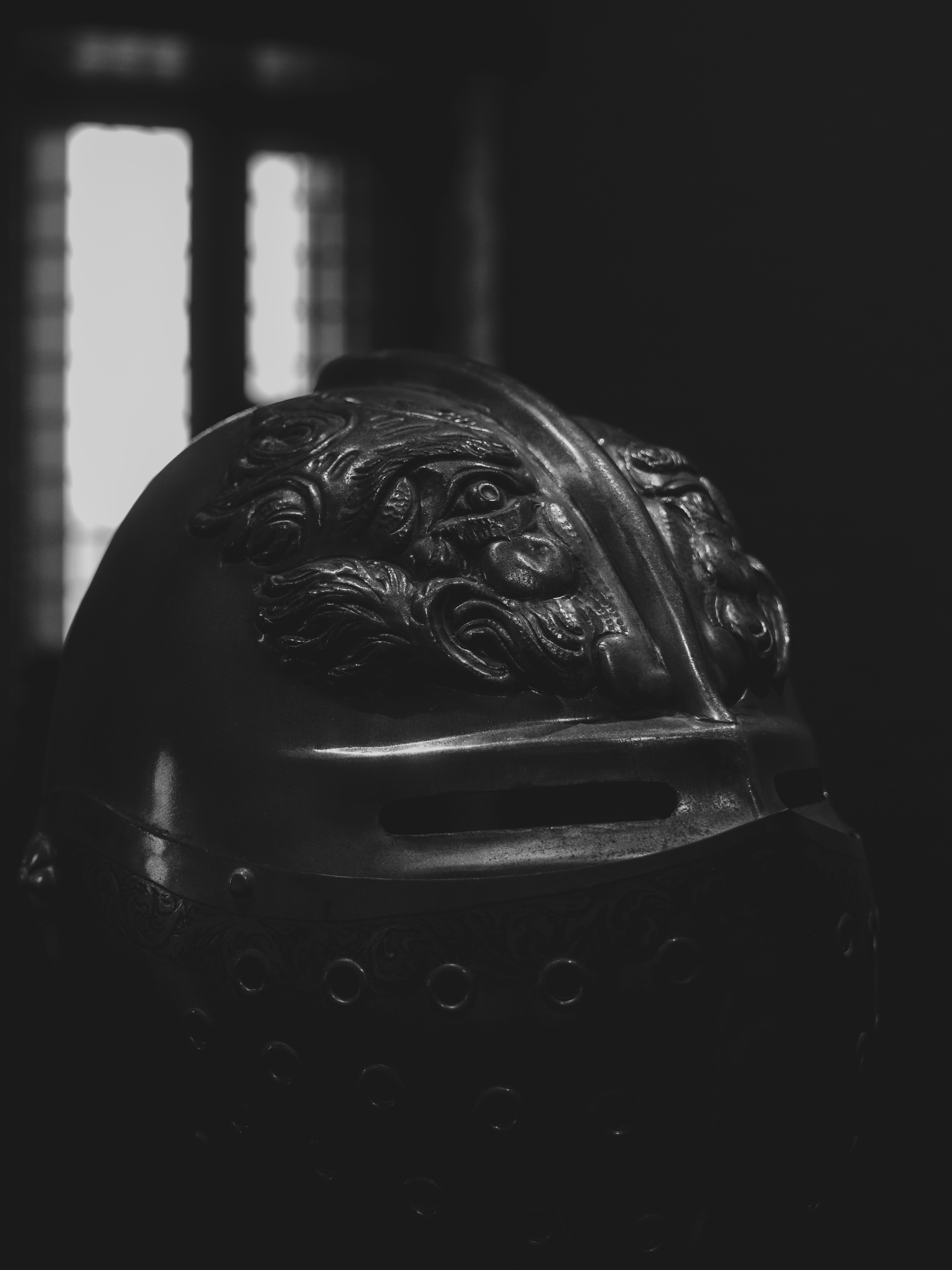 Relic Helmet in Low Light: A Quiet Study of Craft and Shadows