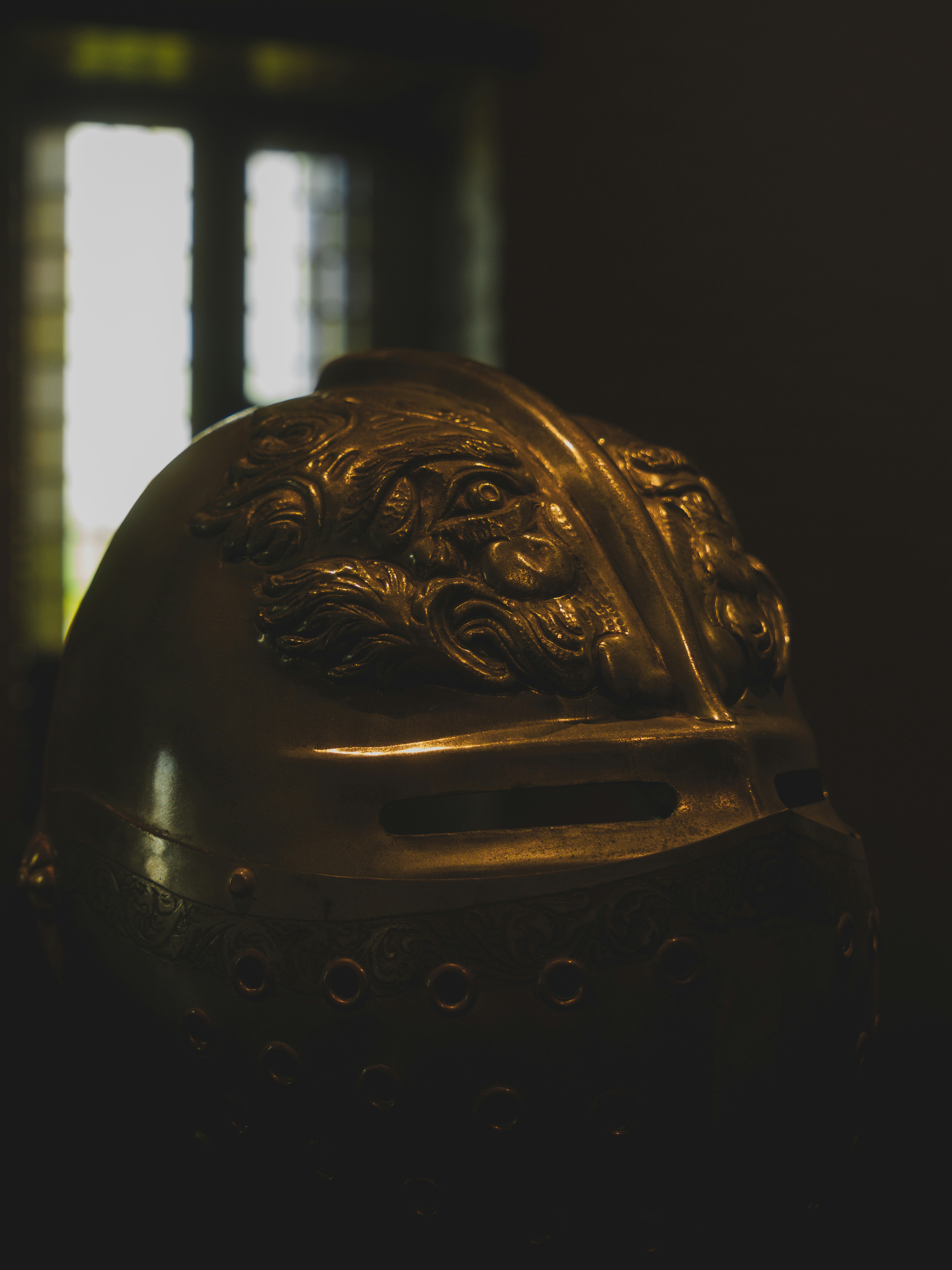 Ambered Armor: A Knight’s Helmet in Obscured Light