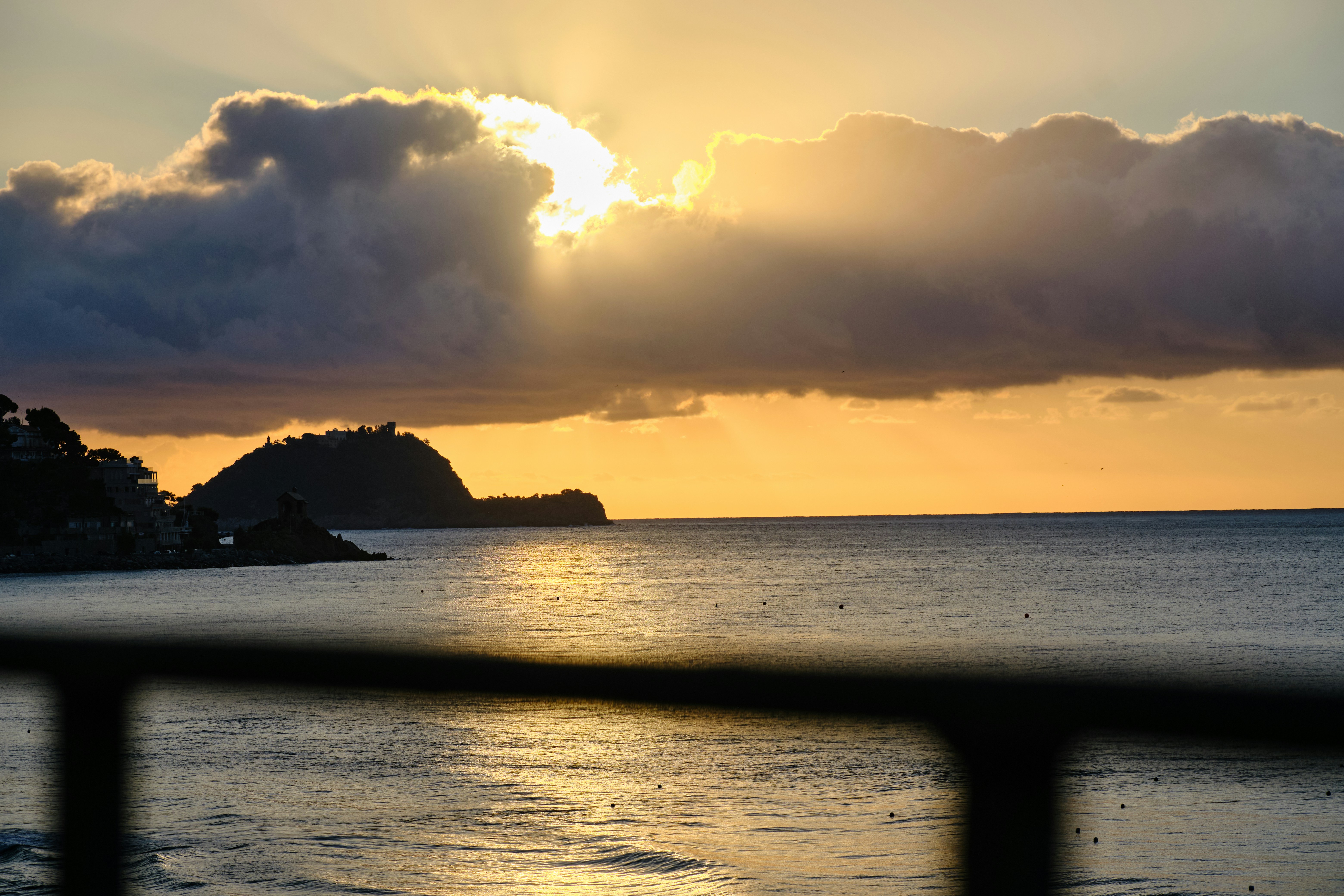 Golden Hour Overlook: Silhouette and Sea