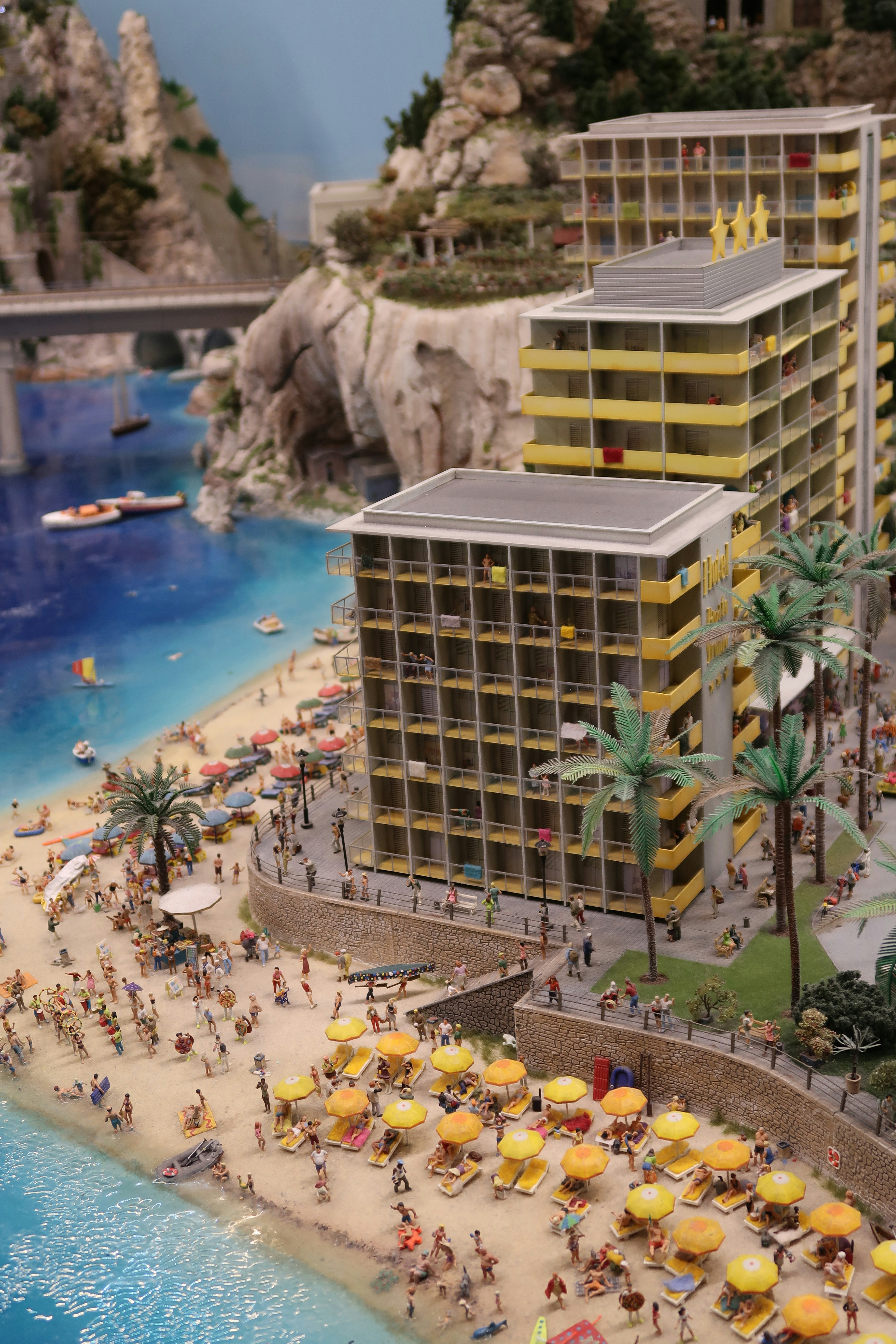 Scaled seaside resort rises from a miniature beach