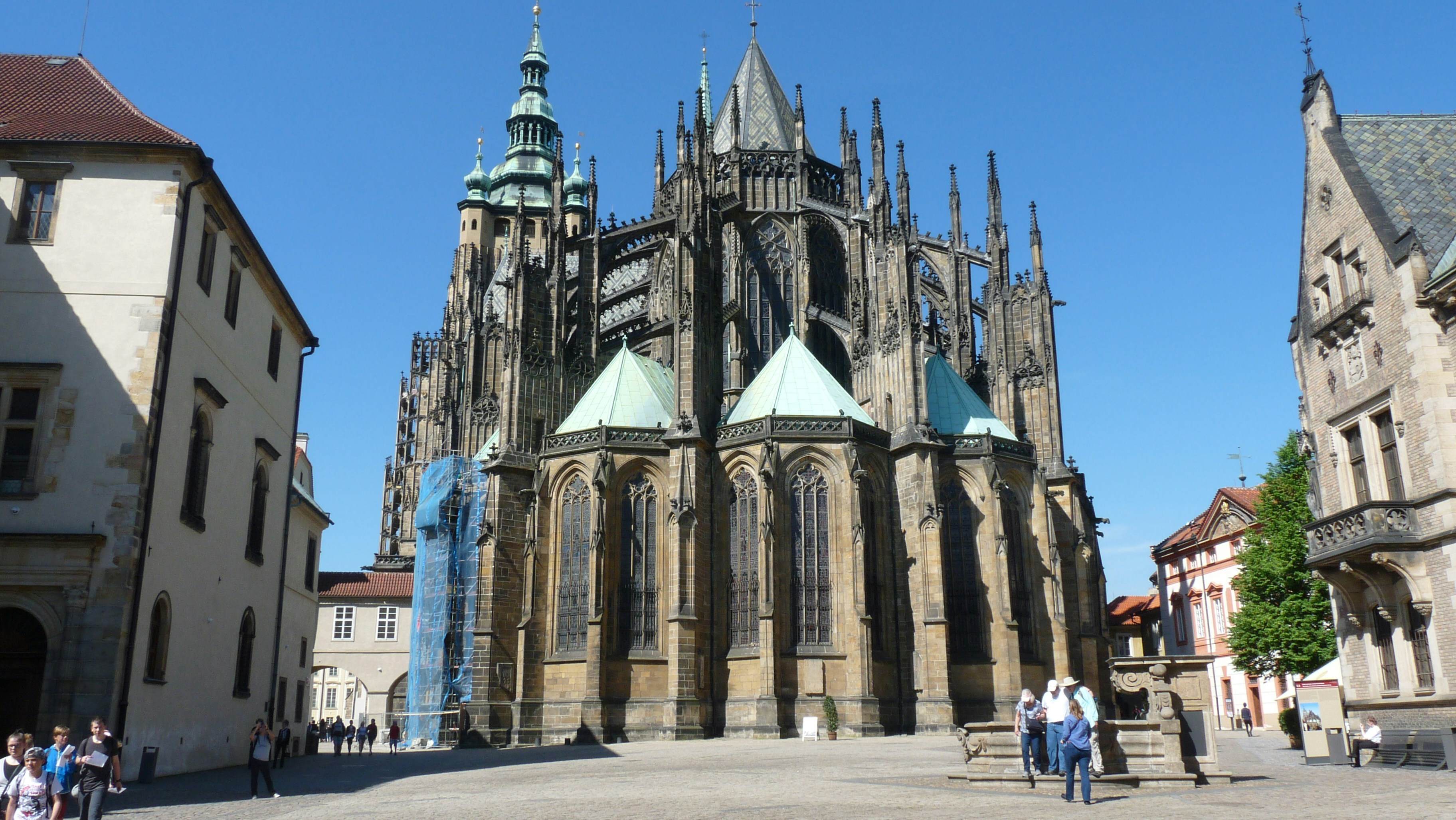 A grand gothic cathedral under a clear blue sky.