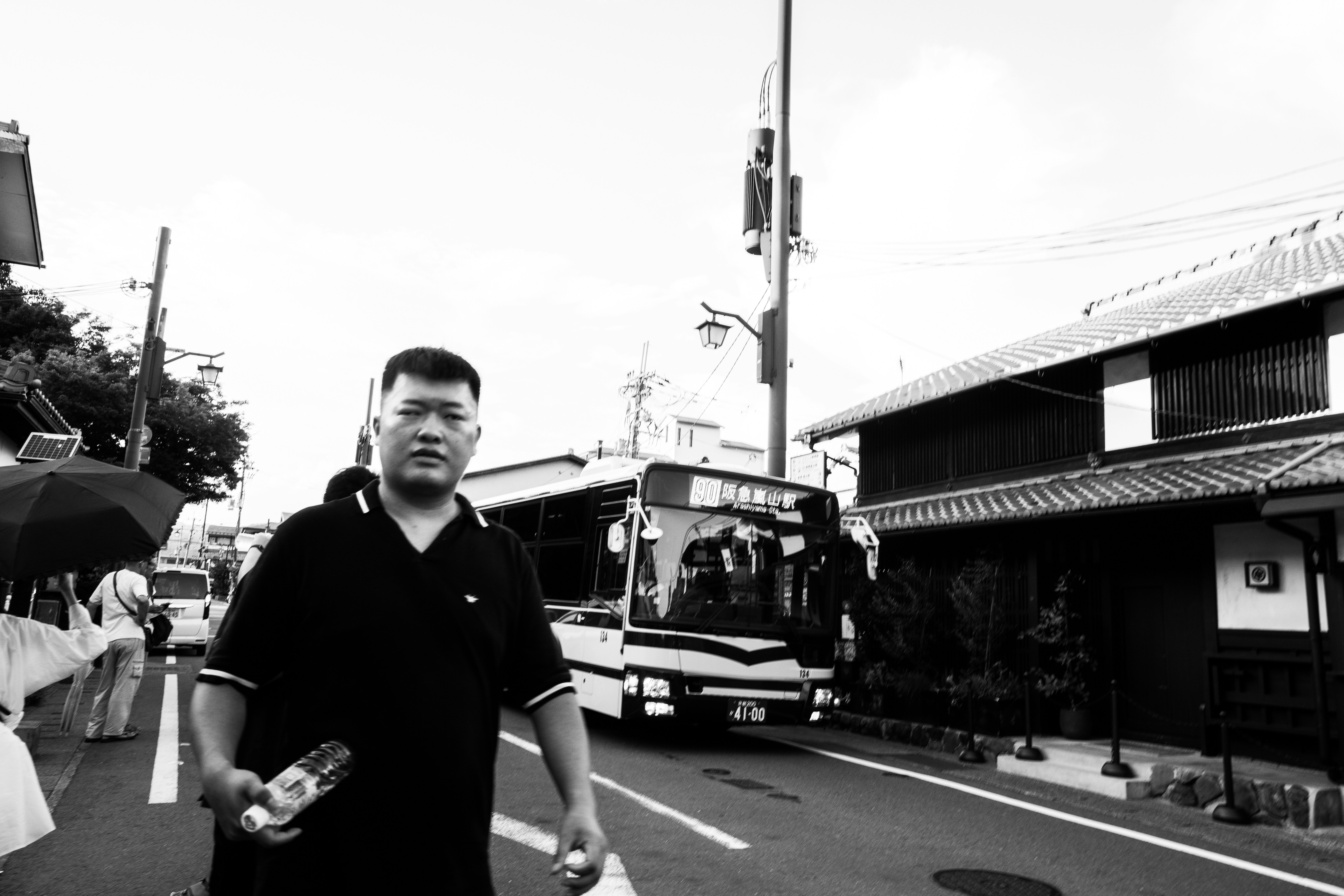 Street Crossing: A Silent Moment at the Bus Stop