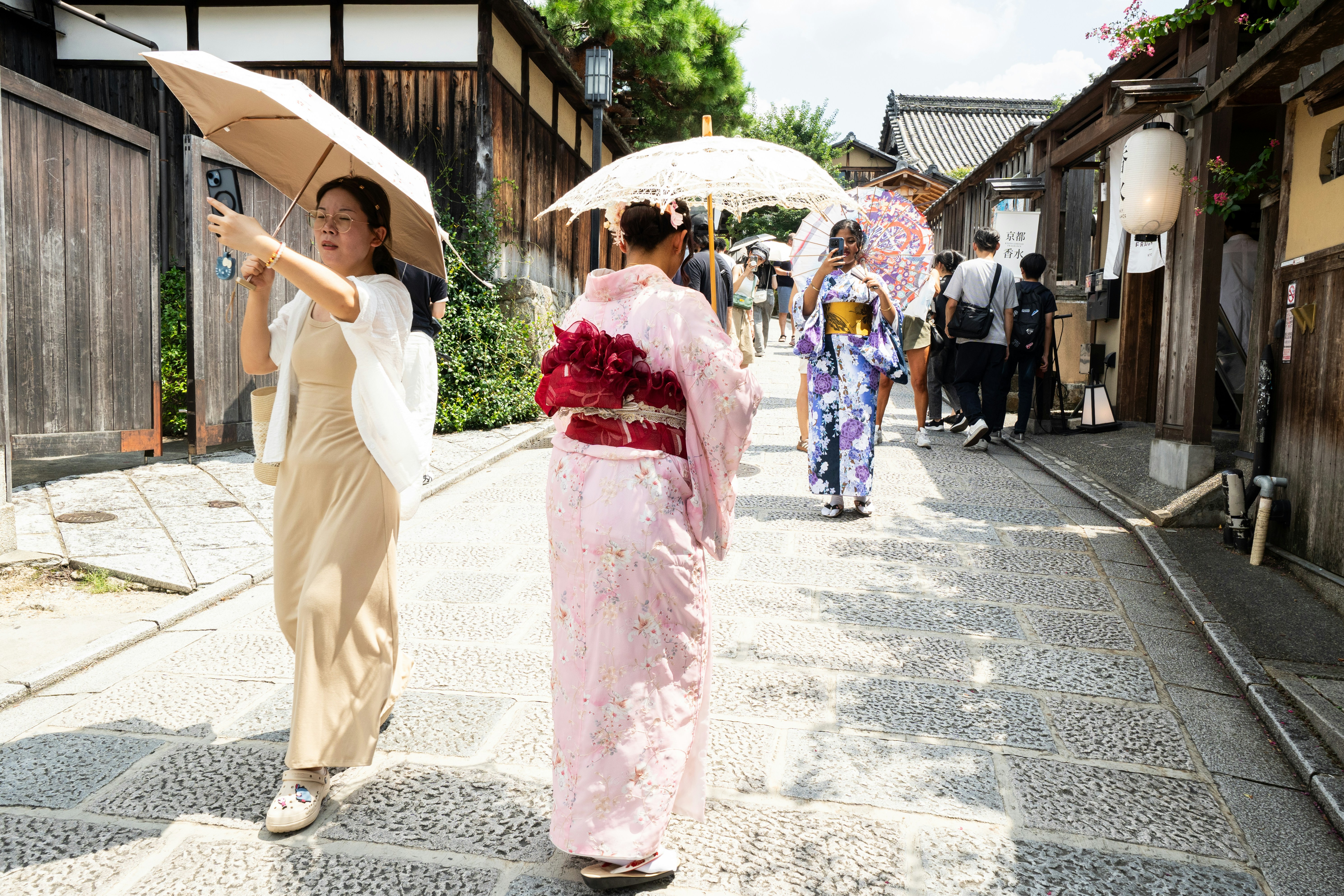 Sunlit Kyoto Street in Kimono Parade