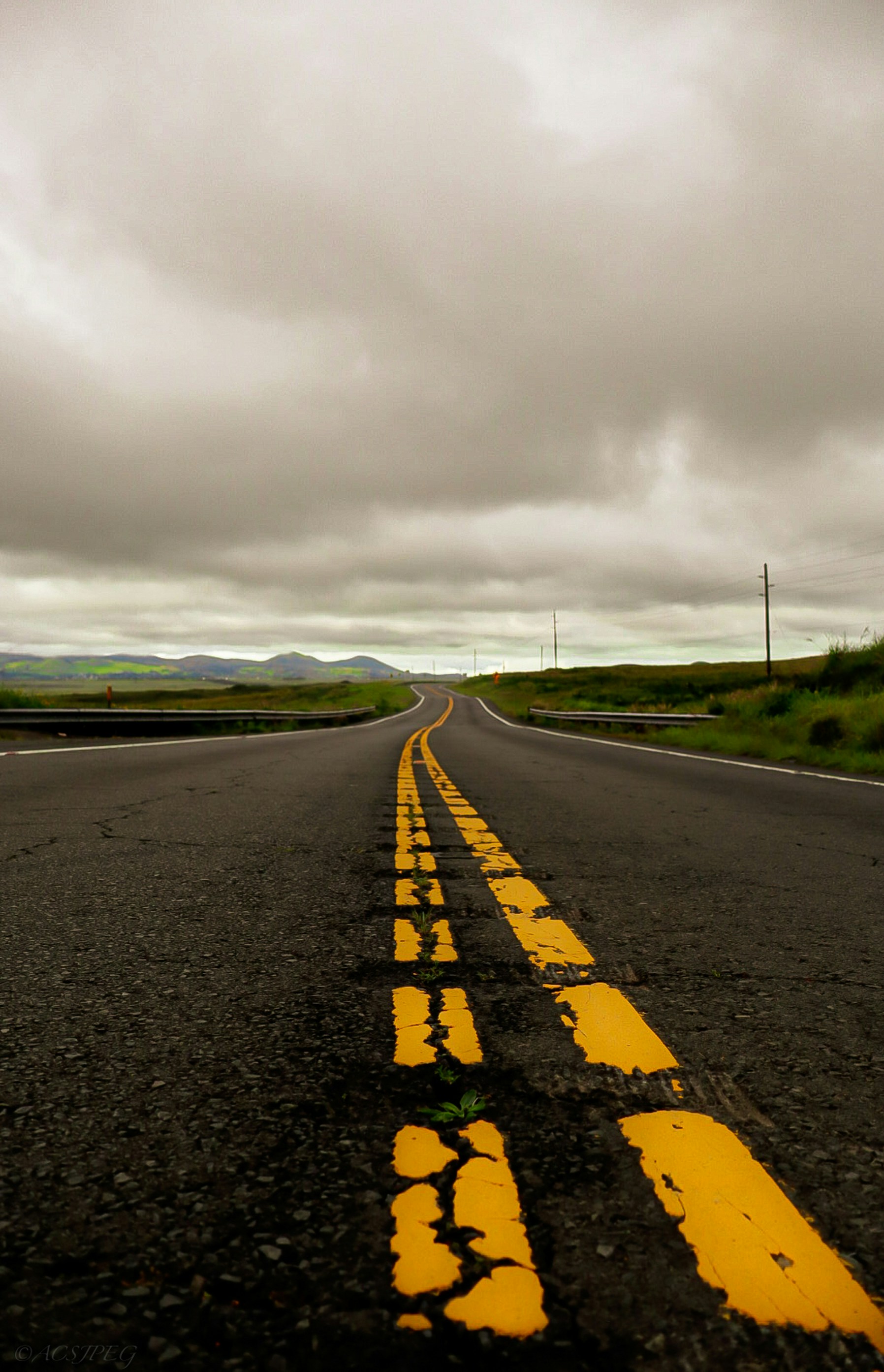 A Yellow Split: A Lonely Highway Reaches the Horizon