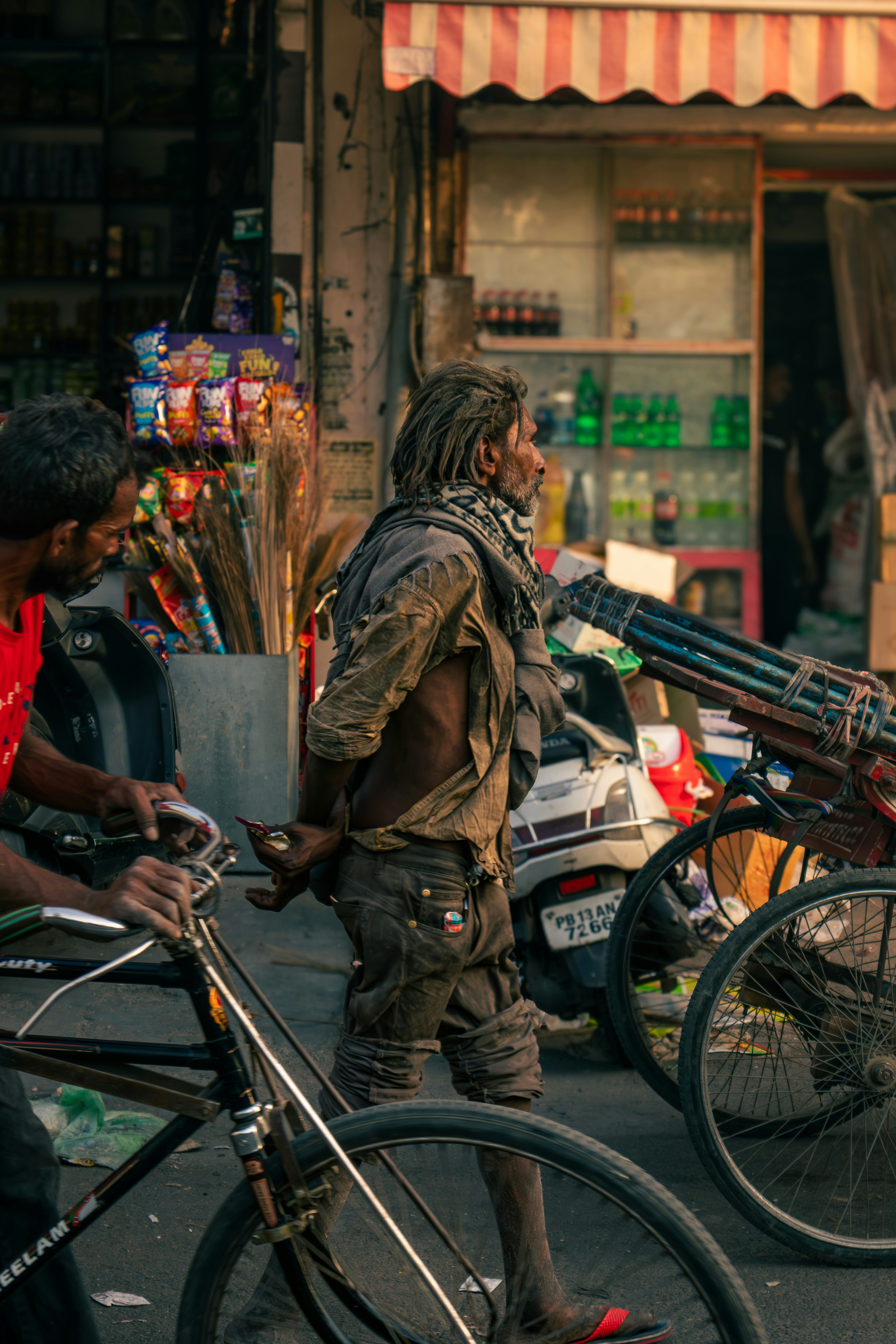 The Streetwise Stranger: A Moment of Pause Among City Fragments