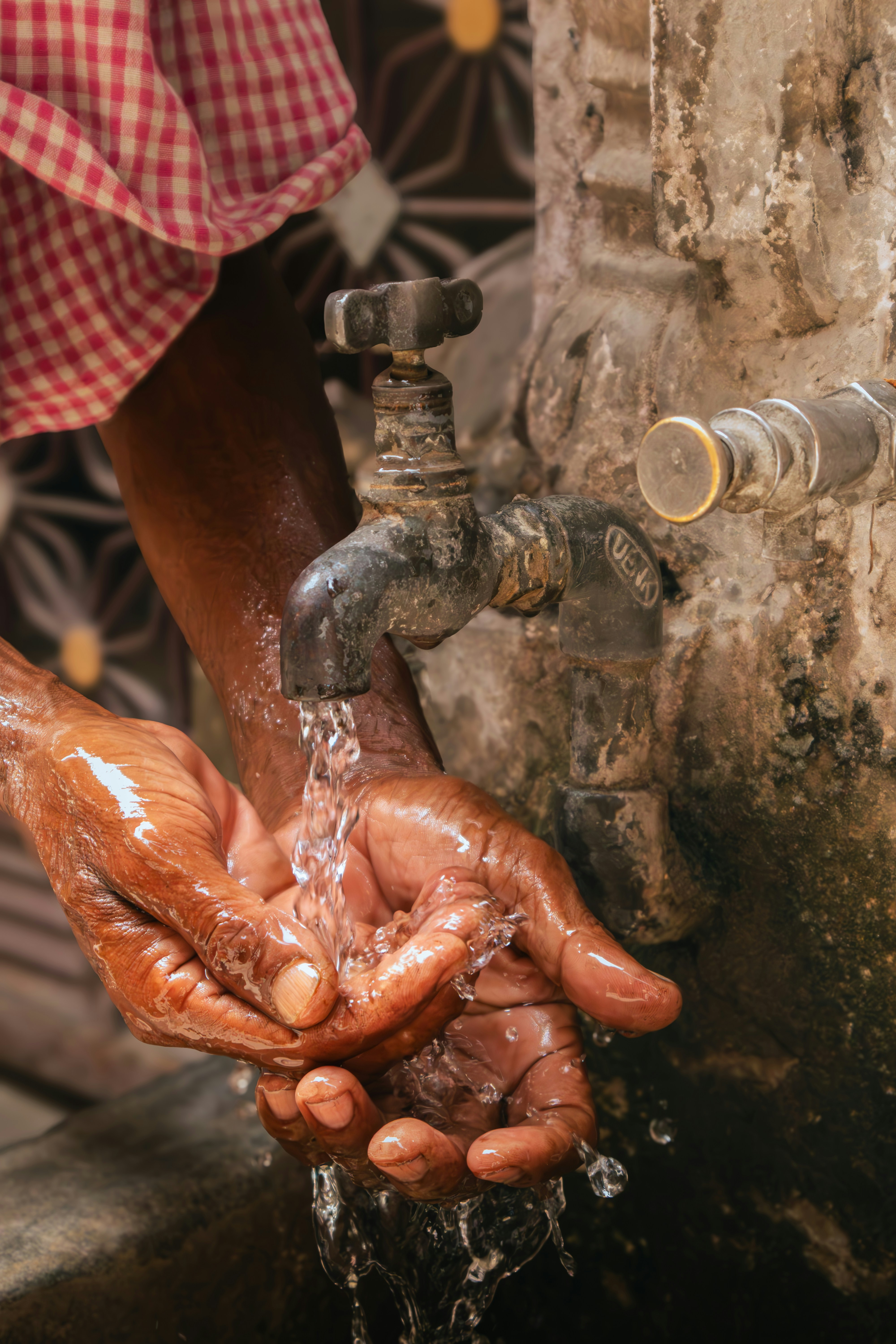 Hands Under Running Water: A Quiet Moment by the Faucet