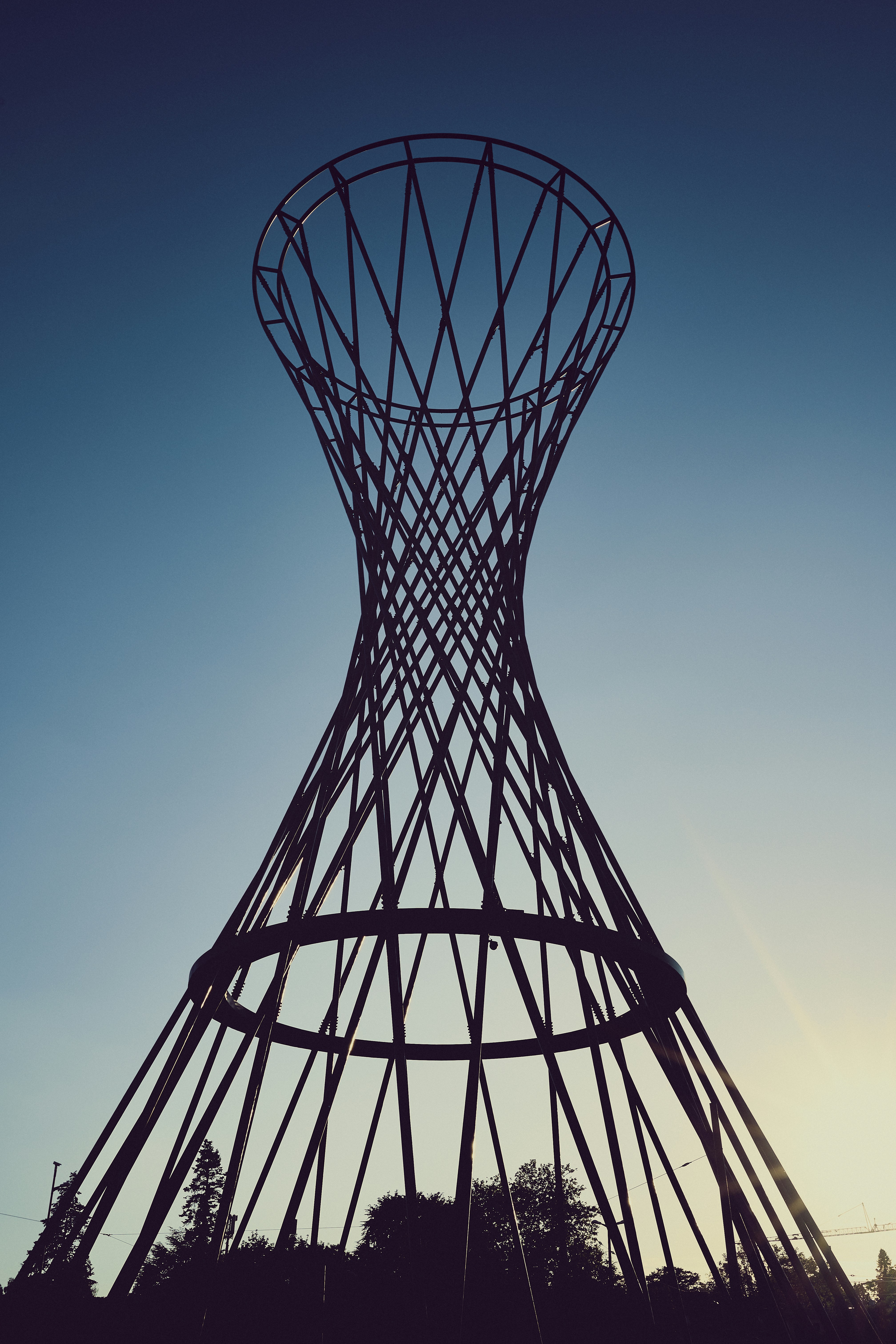 Sculpted Helix: The Twin-Column Lattice Against a Dusk Skyline