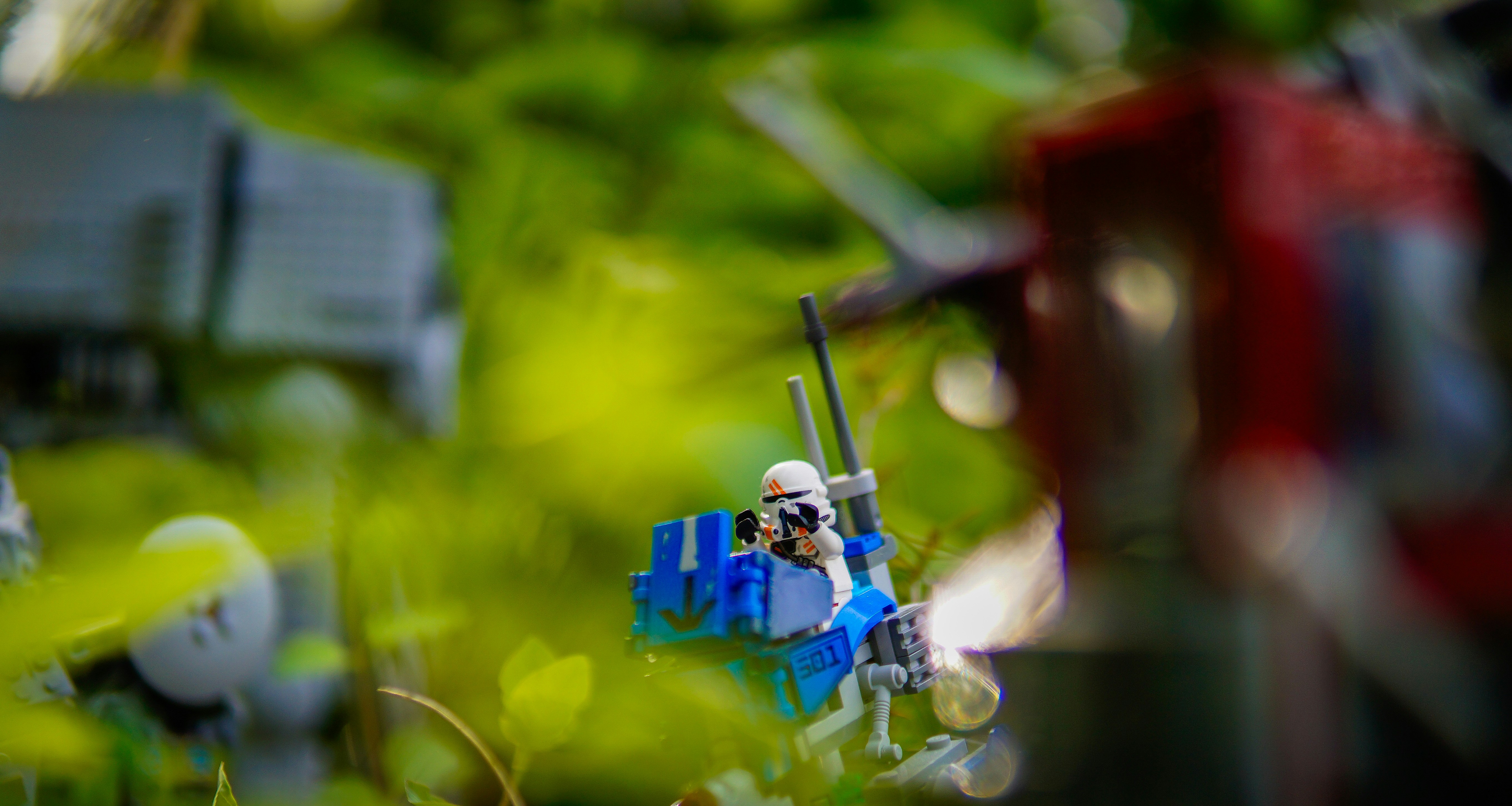 Overgrown Micro Soldier: A Blue LEGO Scout Emerging from the Foliage