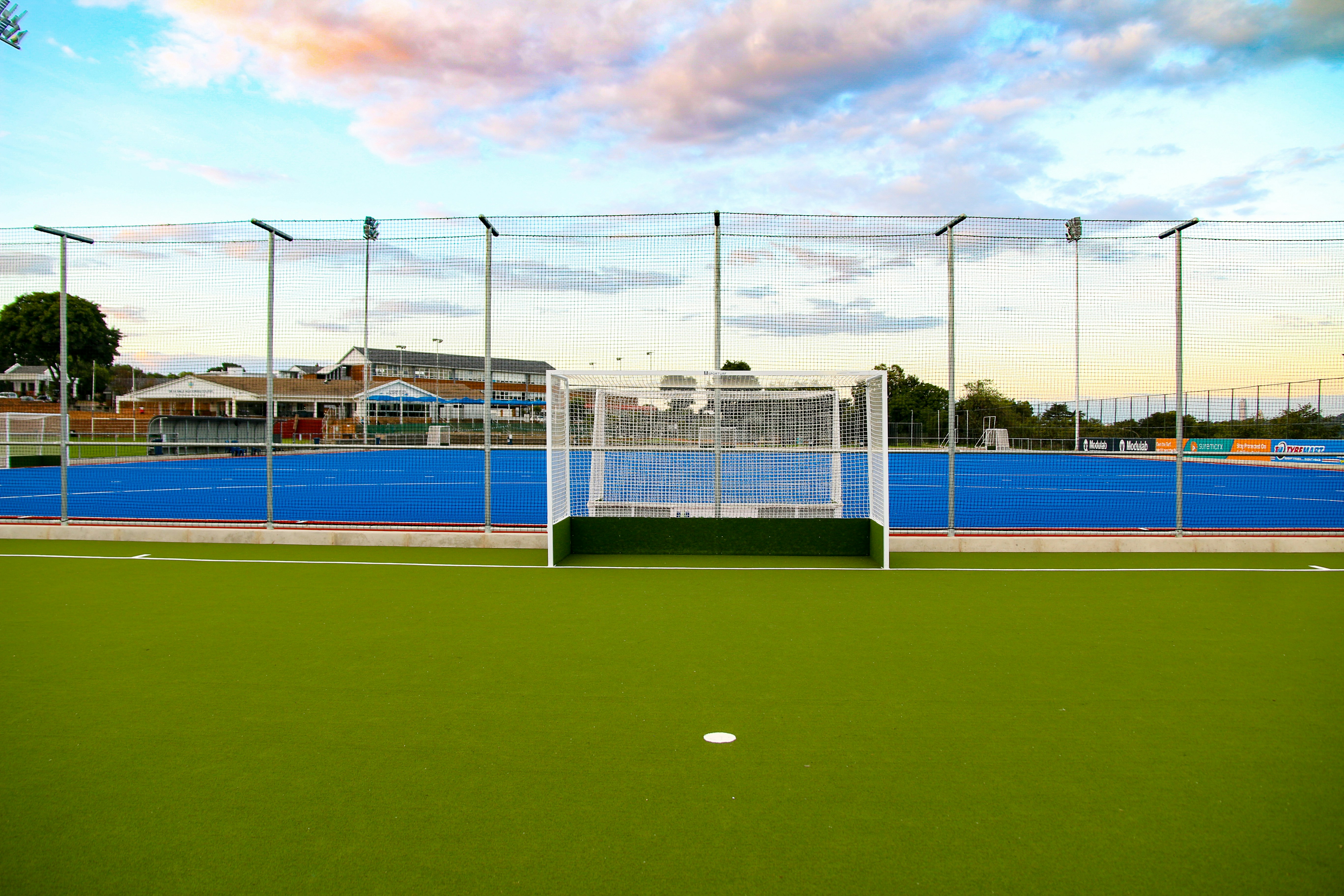 Midfield Goalkeeper’s View: A Futbol Patch Under Open Skies