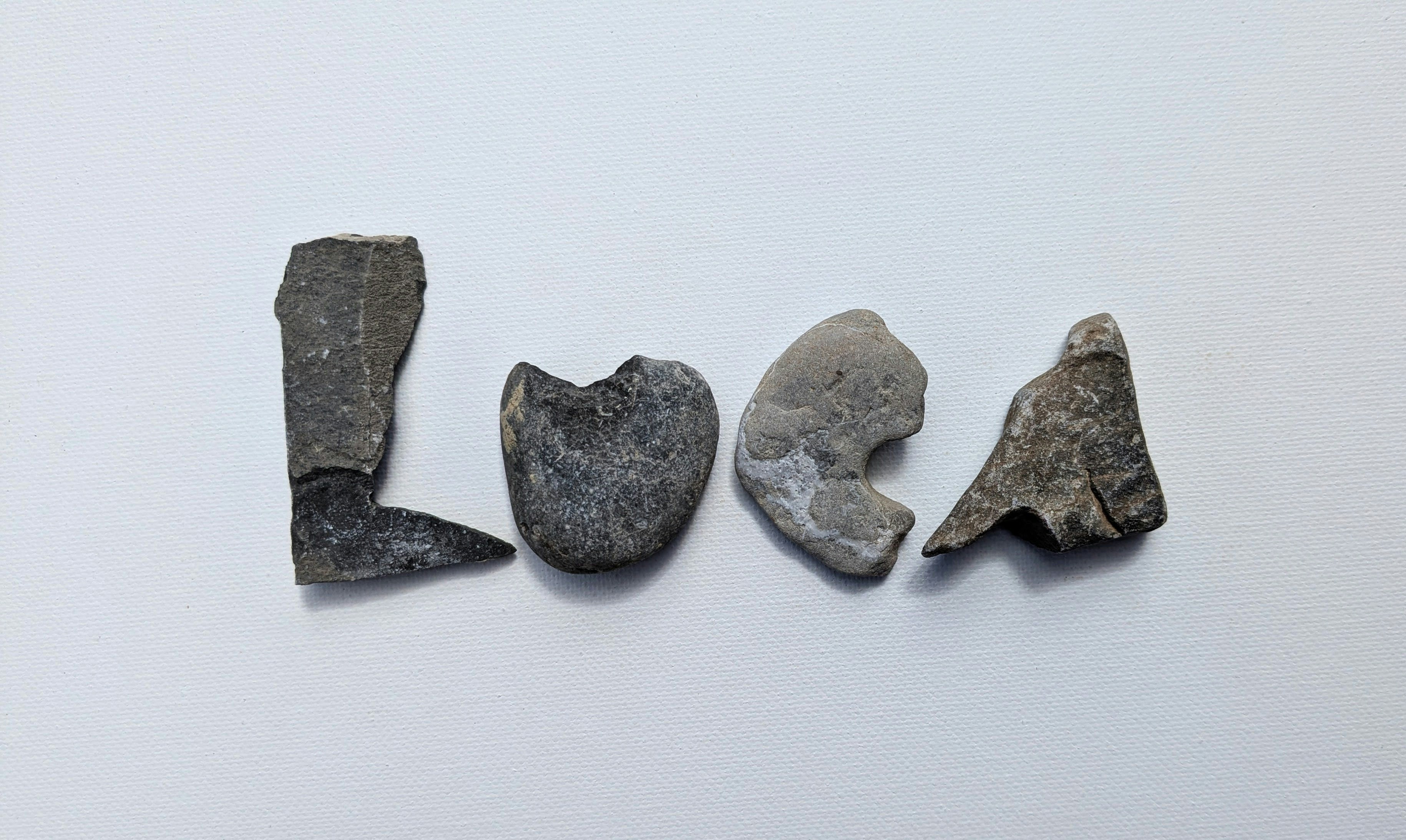 Stone Letters on Bare Page