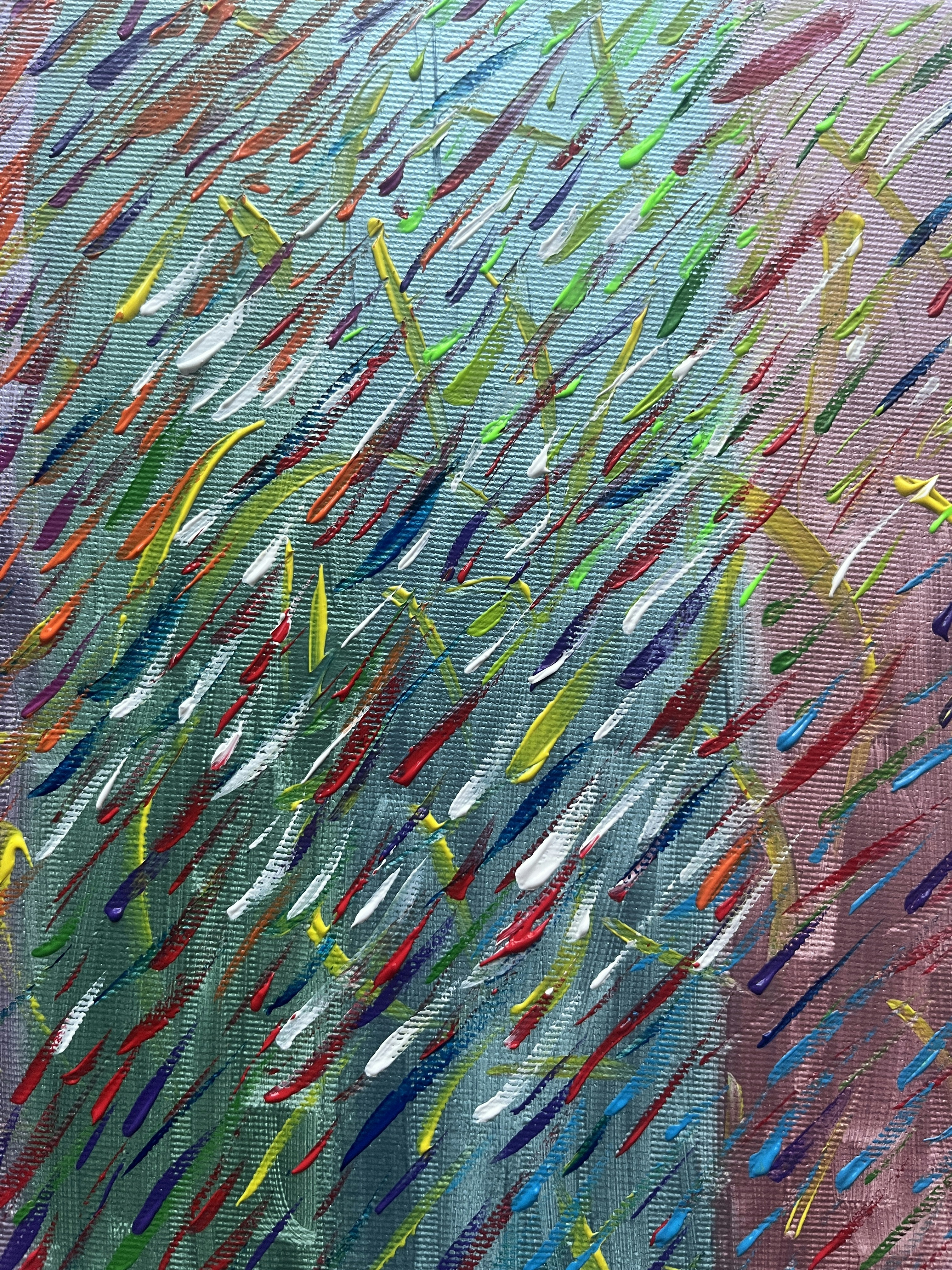 Veil of Color: a silhouette behind a rain of glass
