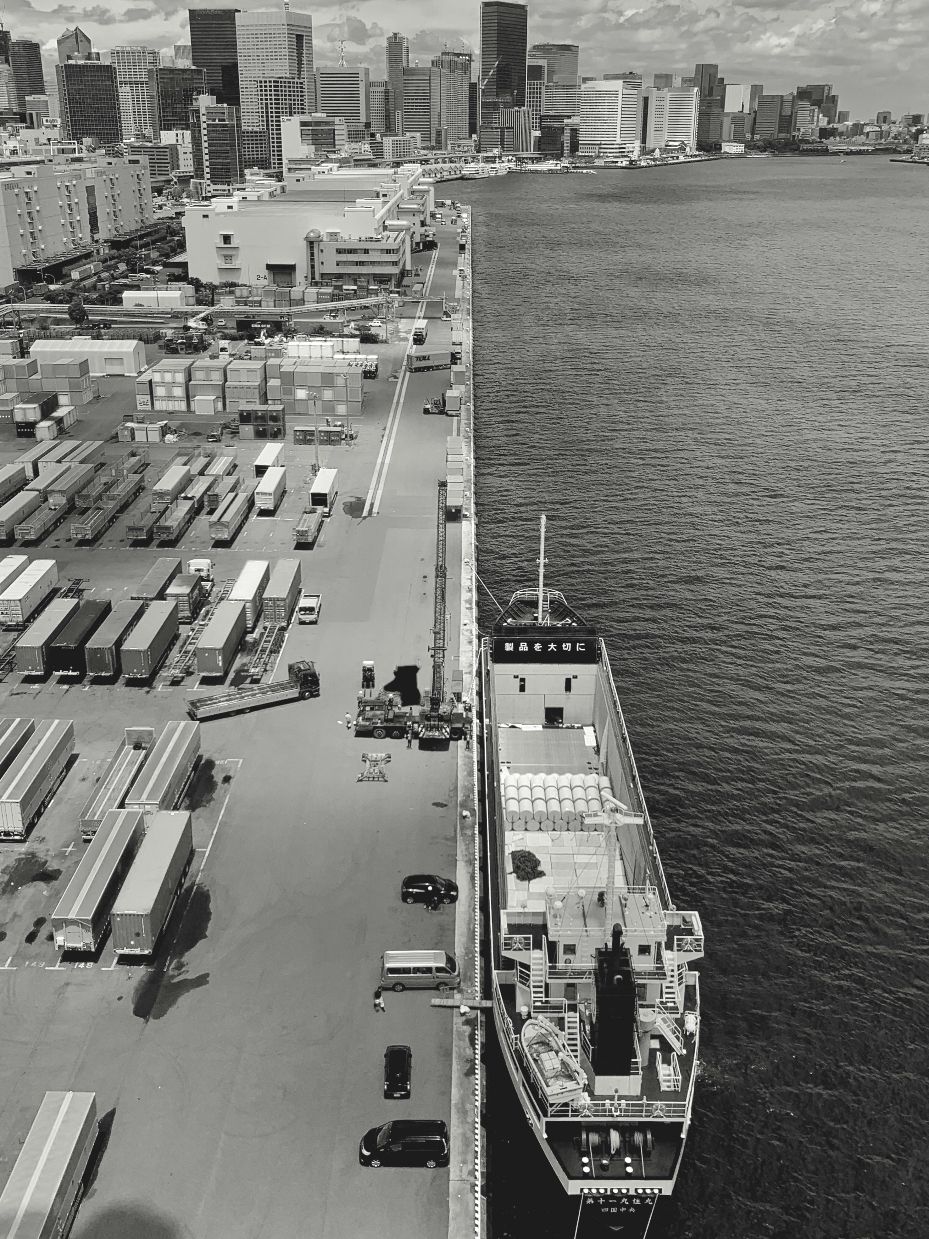 Harbor Corridor: Industrial Dockside with City Skyline