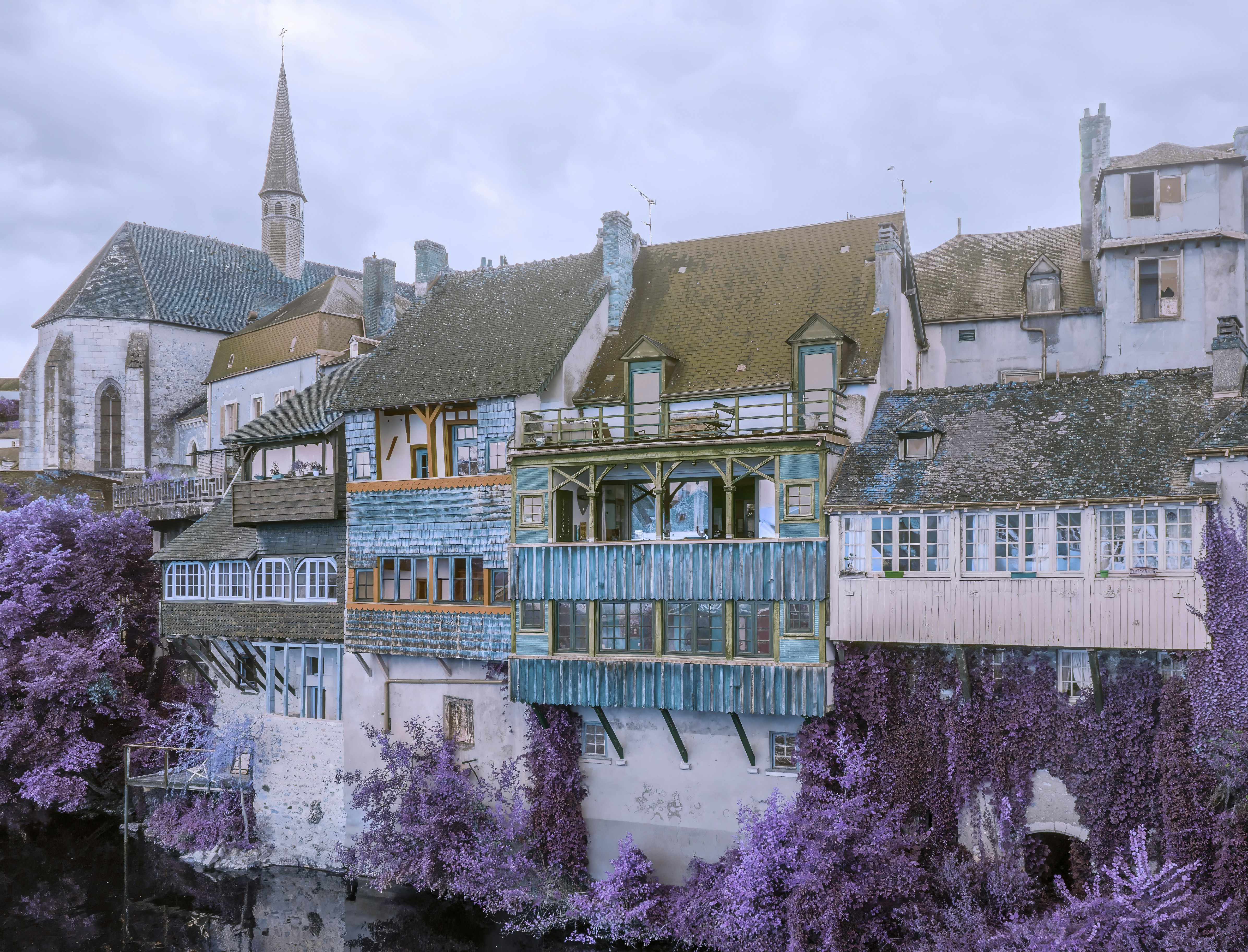 Timbered Facades Over a Lavender River