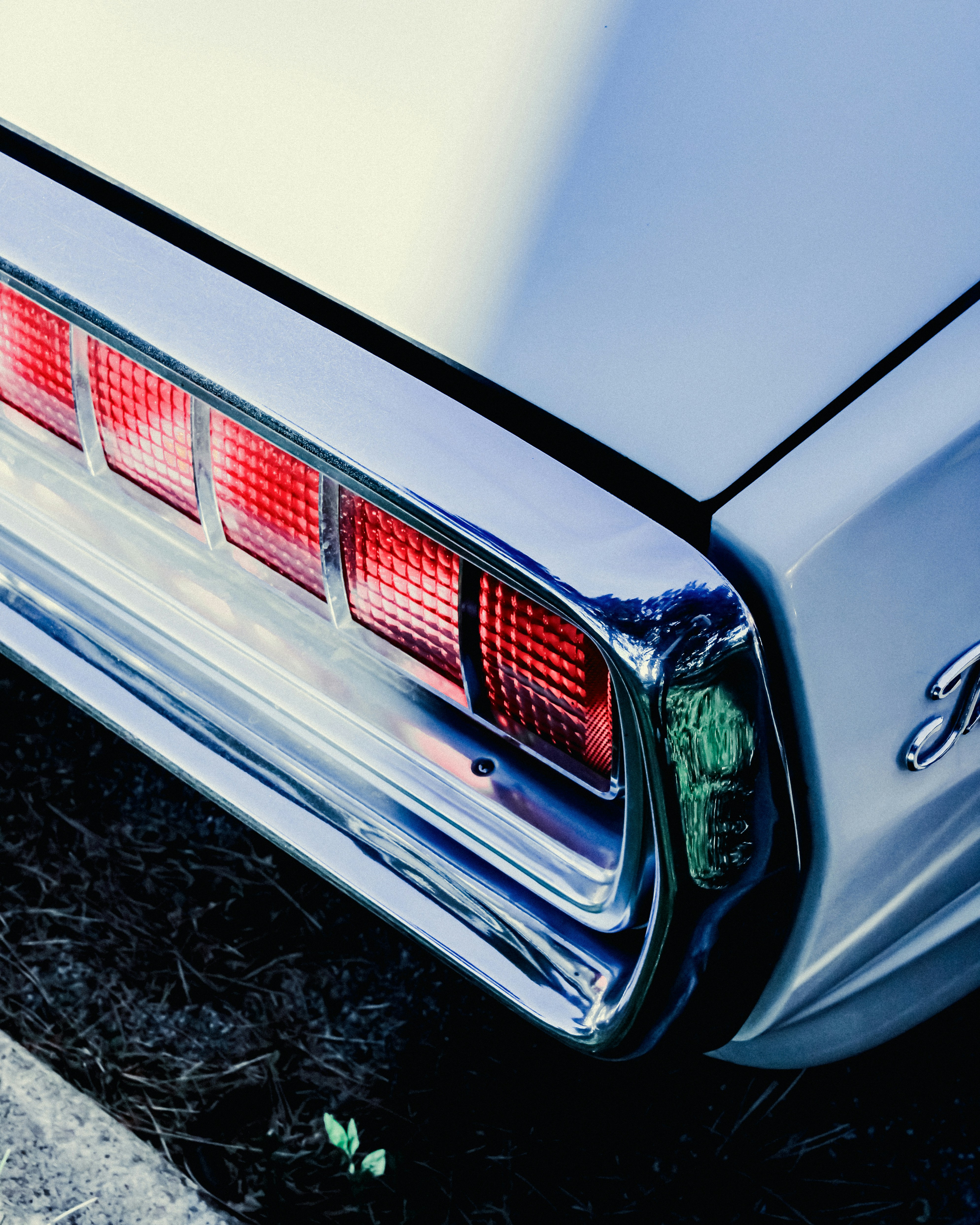 Chrome Tale: The Tail Lights and Crest of a Classic