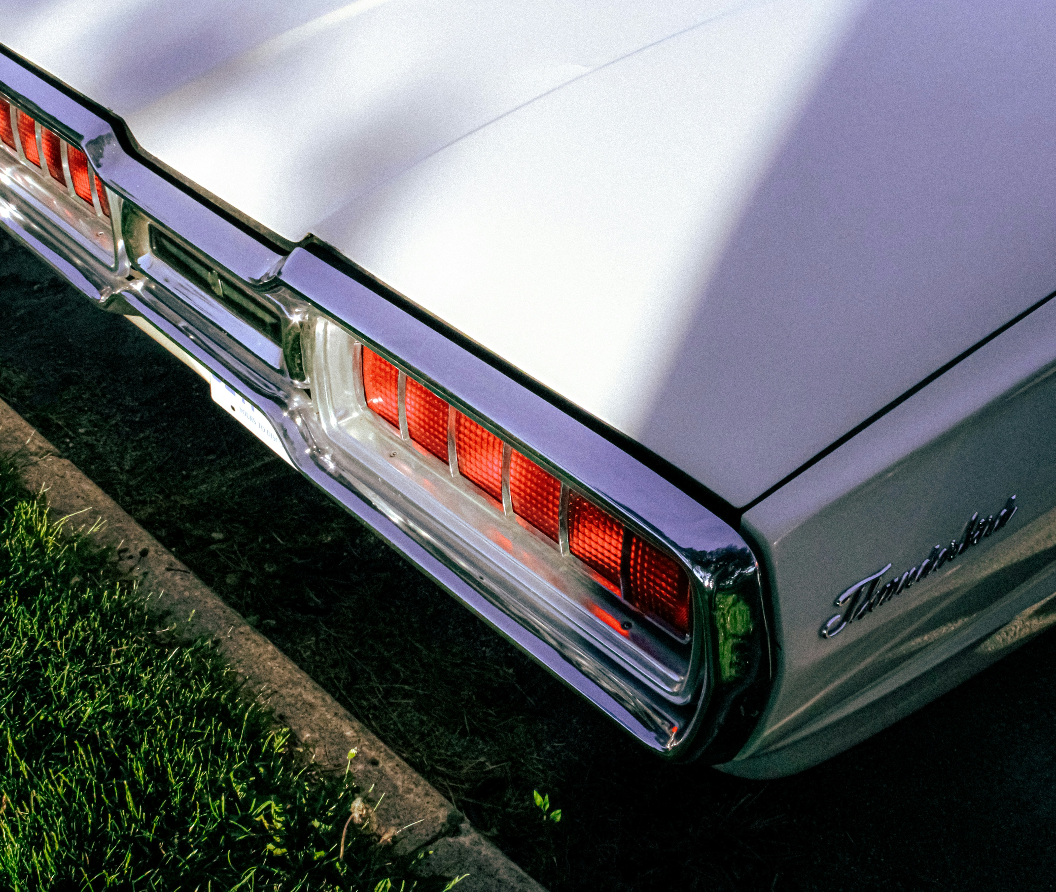 Chrome Edge and Red Tail Lights: Vintage Car Corner