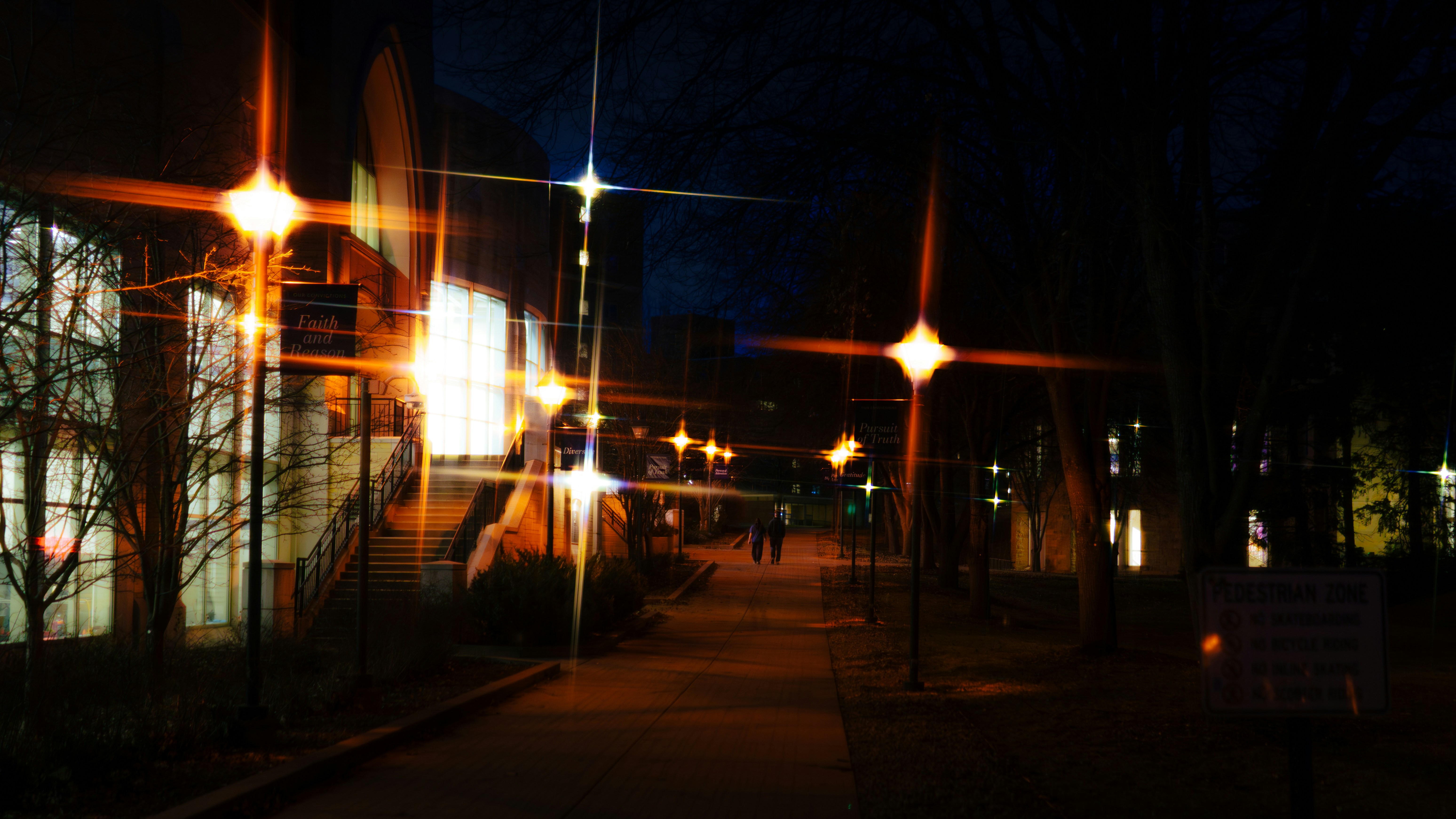 Night Walkway in Warm Orbit of Street Lights