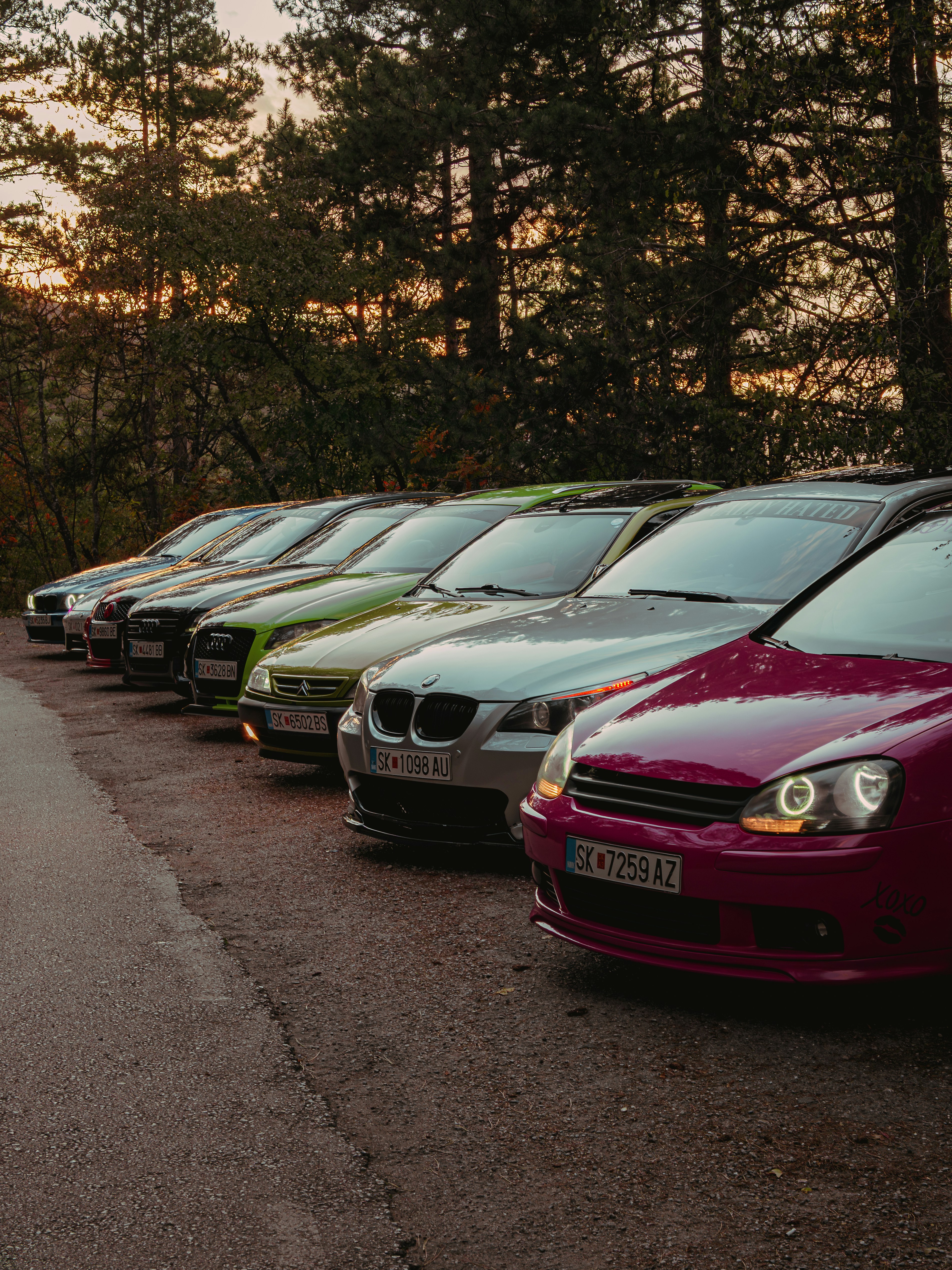 Line of Colors: A Row of Sporty Hatchbacks at Dusk