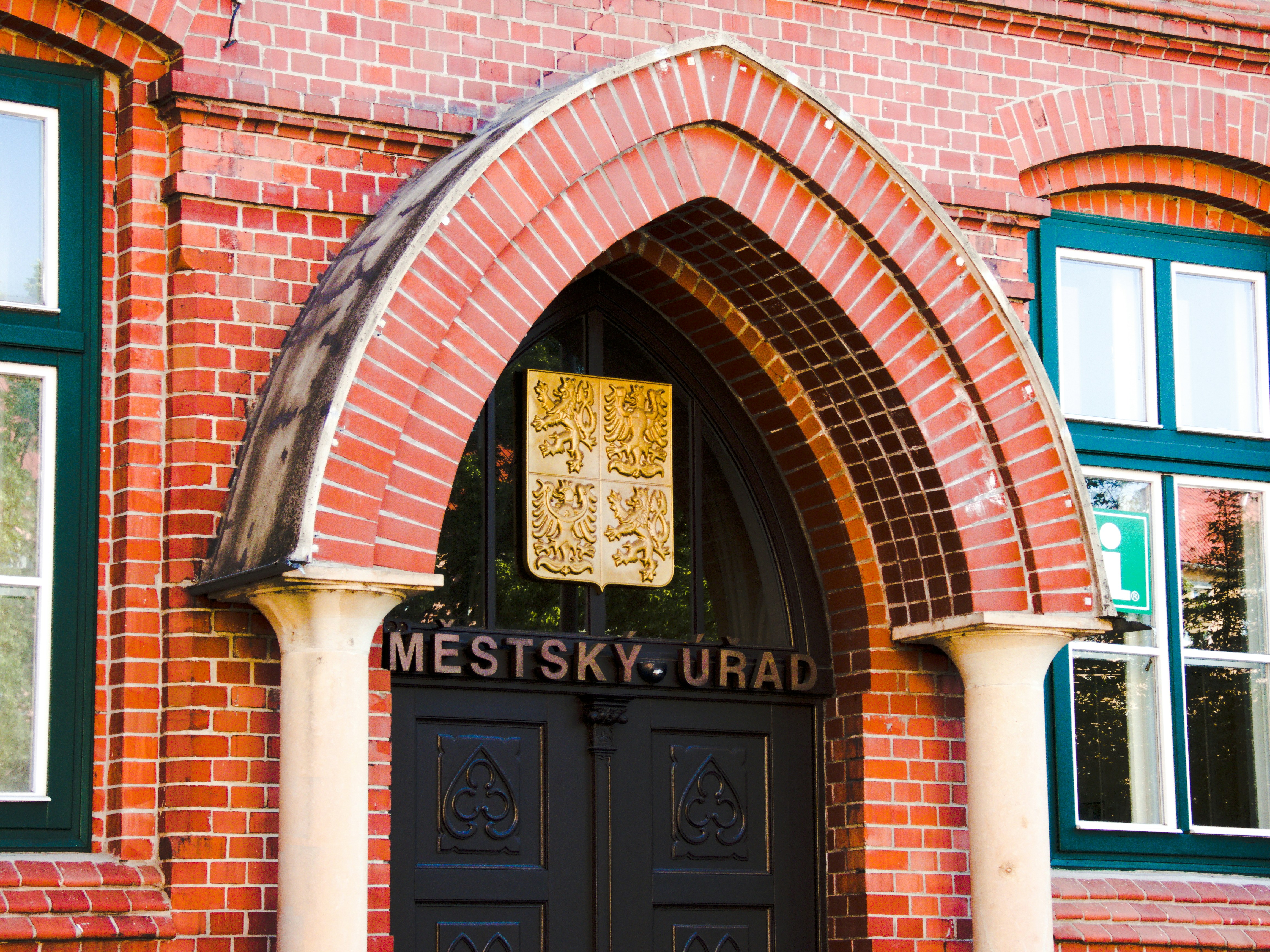 Archway of the City Gate: Crestful Entrance to the Brick Facade