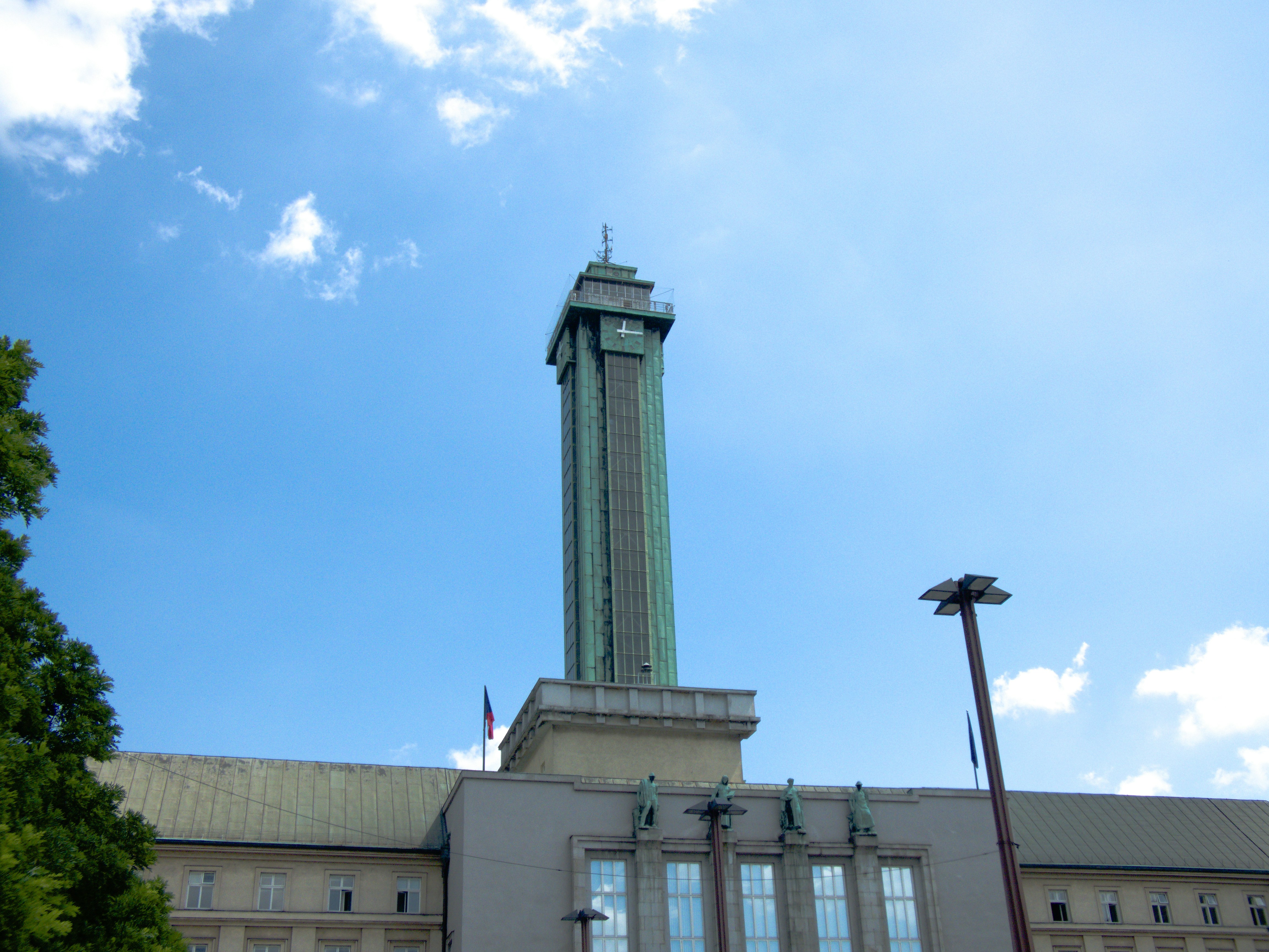 Towering Clocktower Over a Civic Facade at High Noon