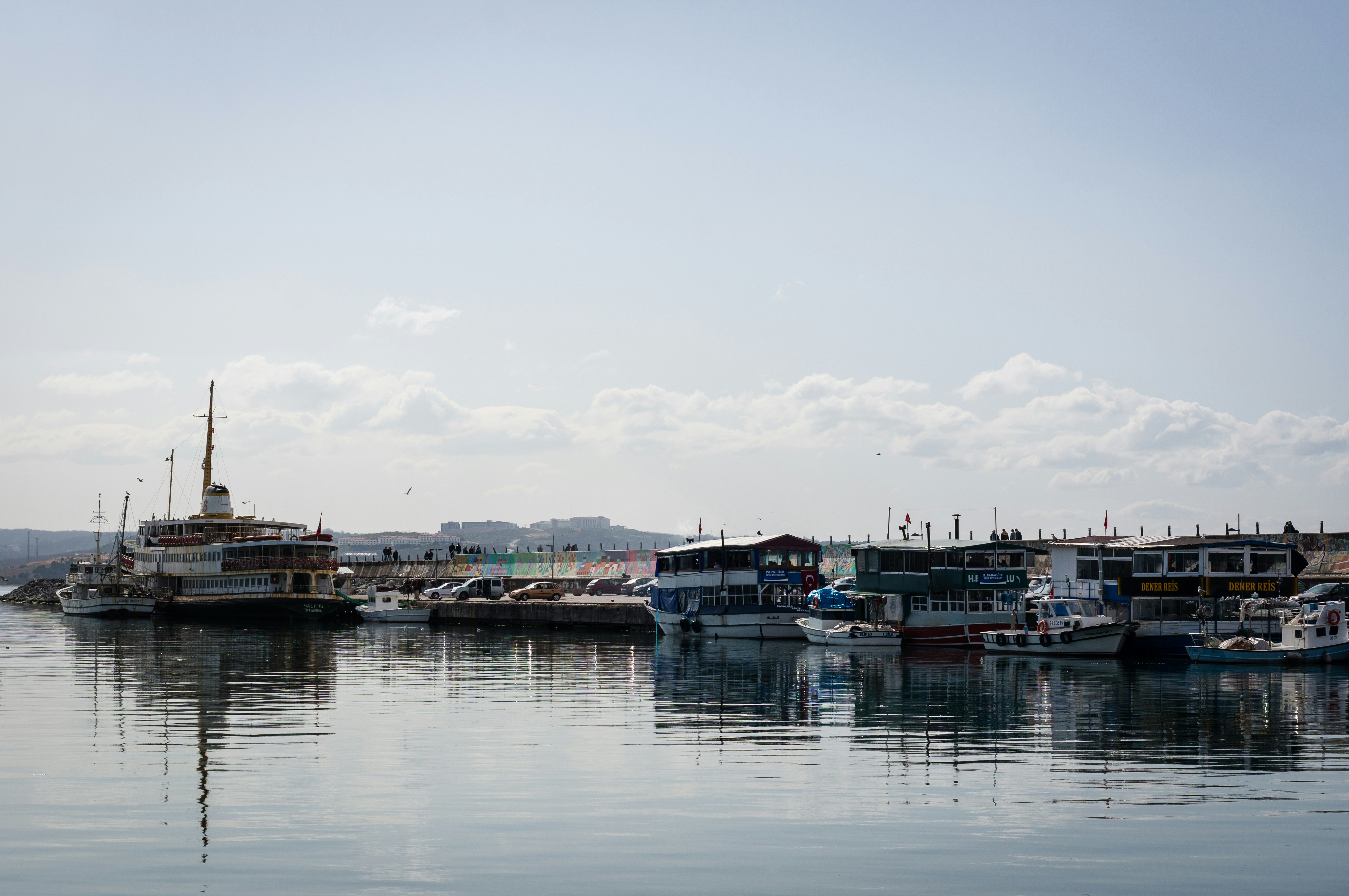 Harbor Lines: Boats Rest Along a Quiet Waterfront