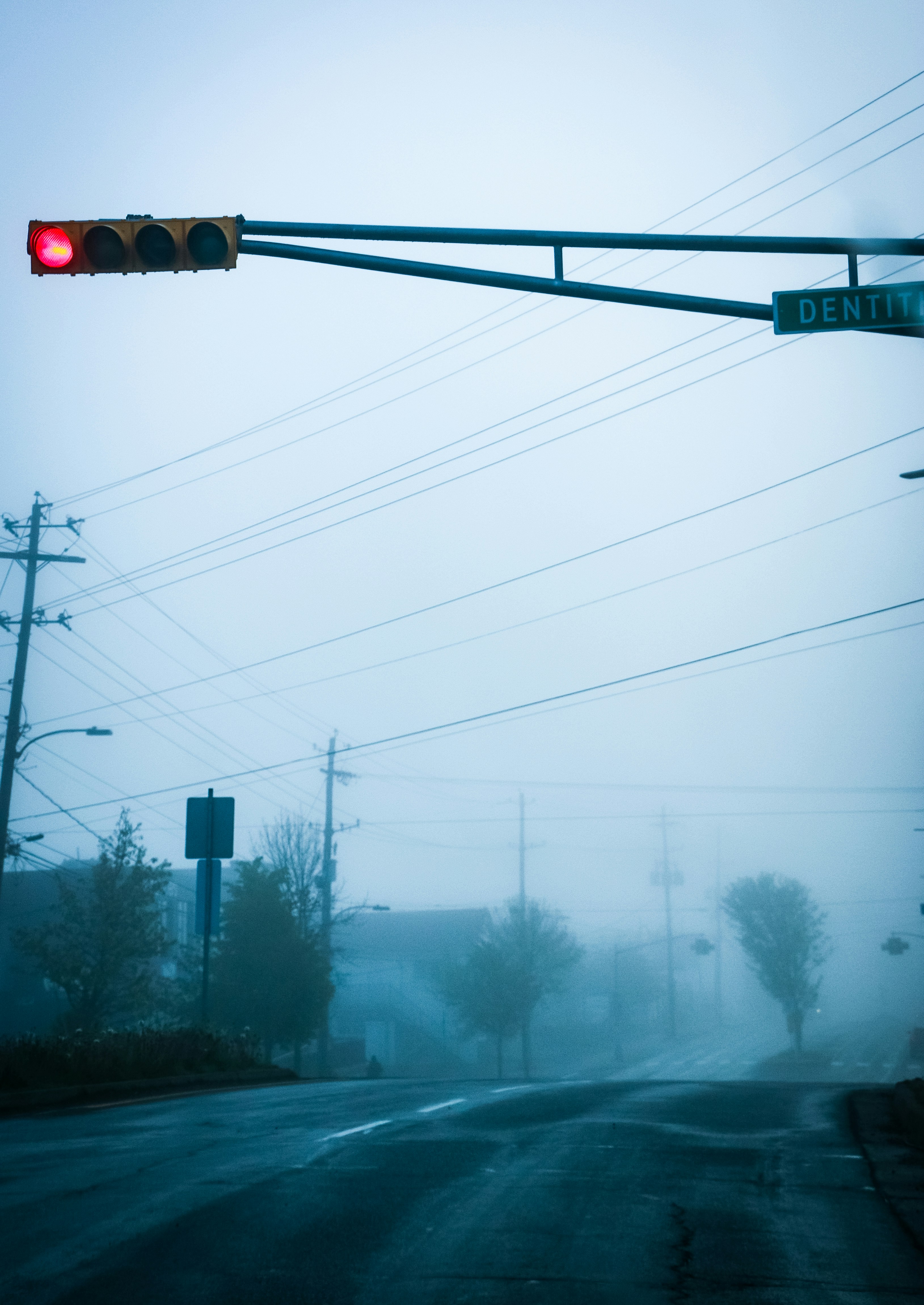 Red Light at a Misty Intersection