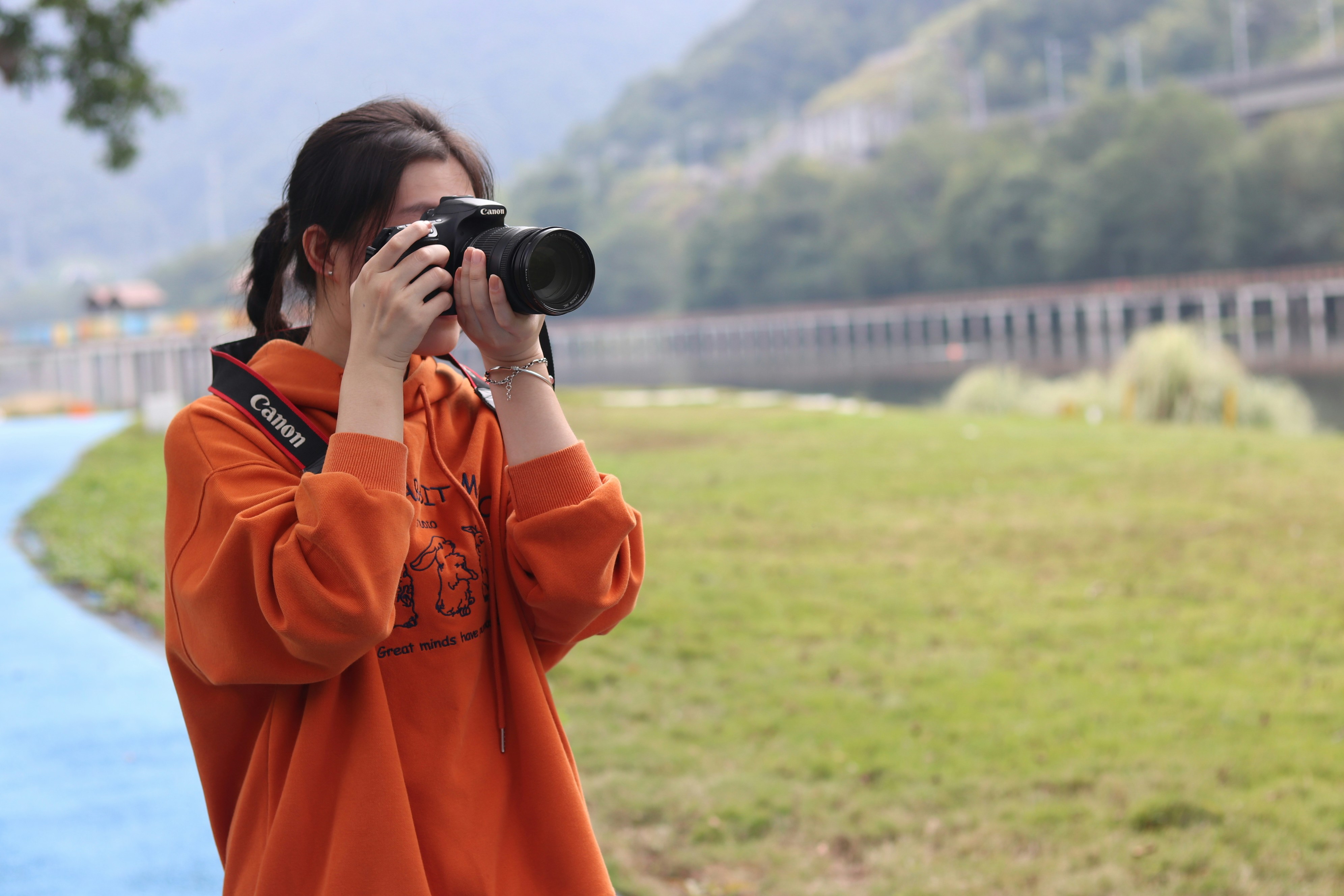 Orange Hoodie Portrait in an Open Park with a DSLR Shoot