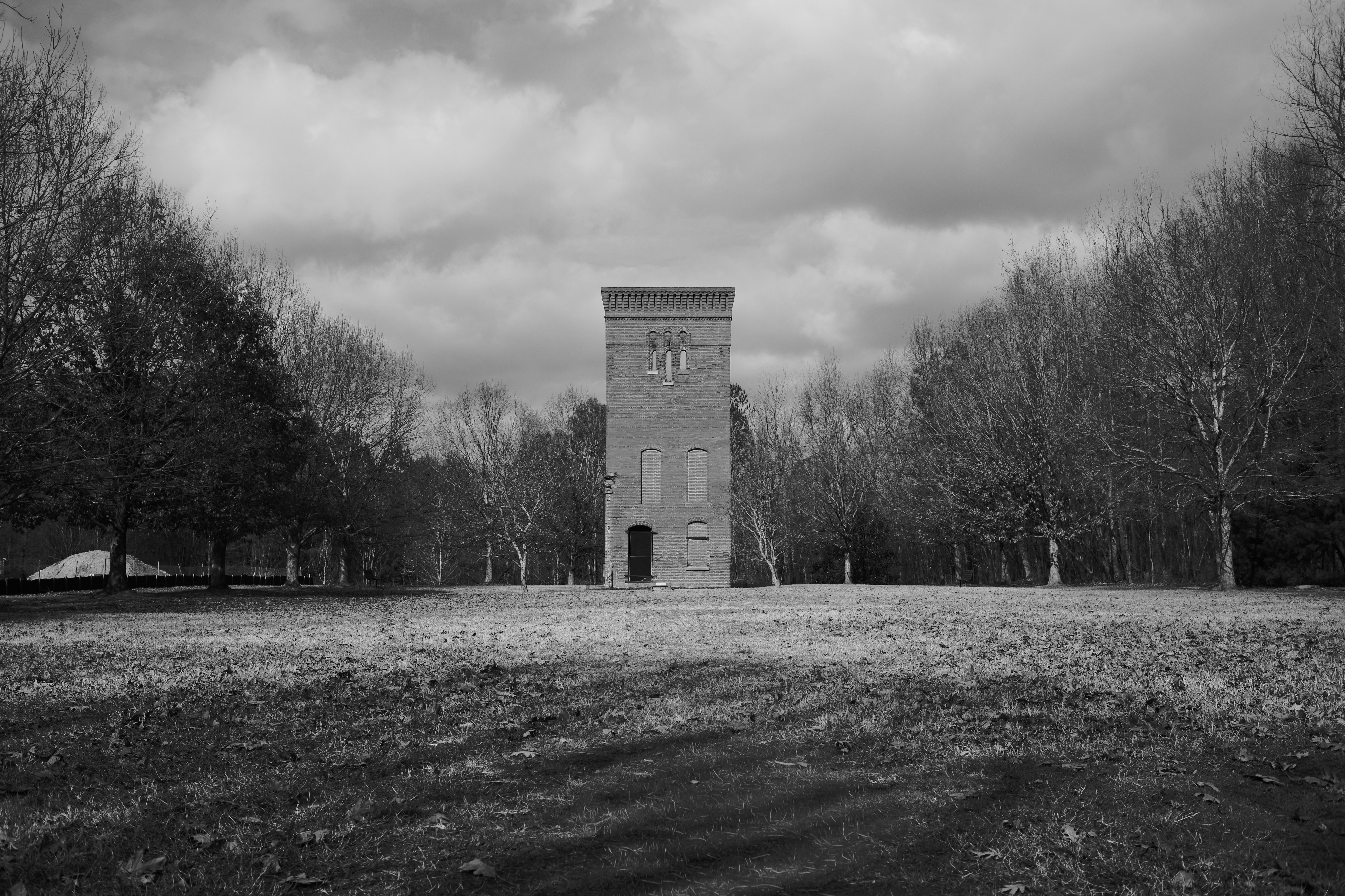  solitary tower rising from a wintery field