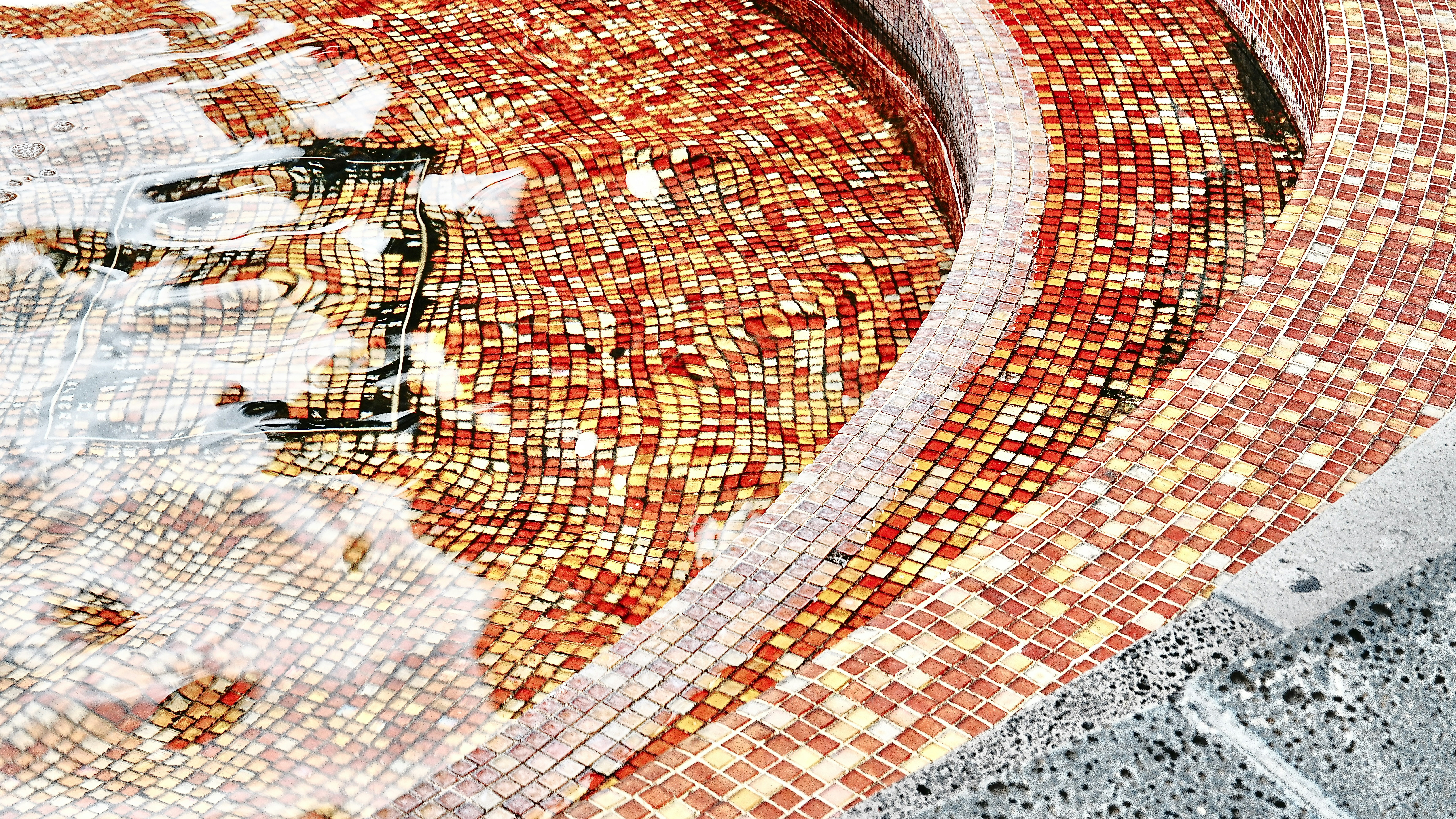 Mosaic Ripples: A Geometric Sea of Tiles in Motion